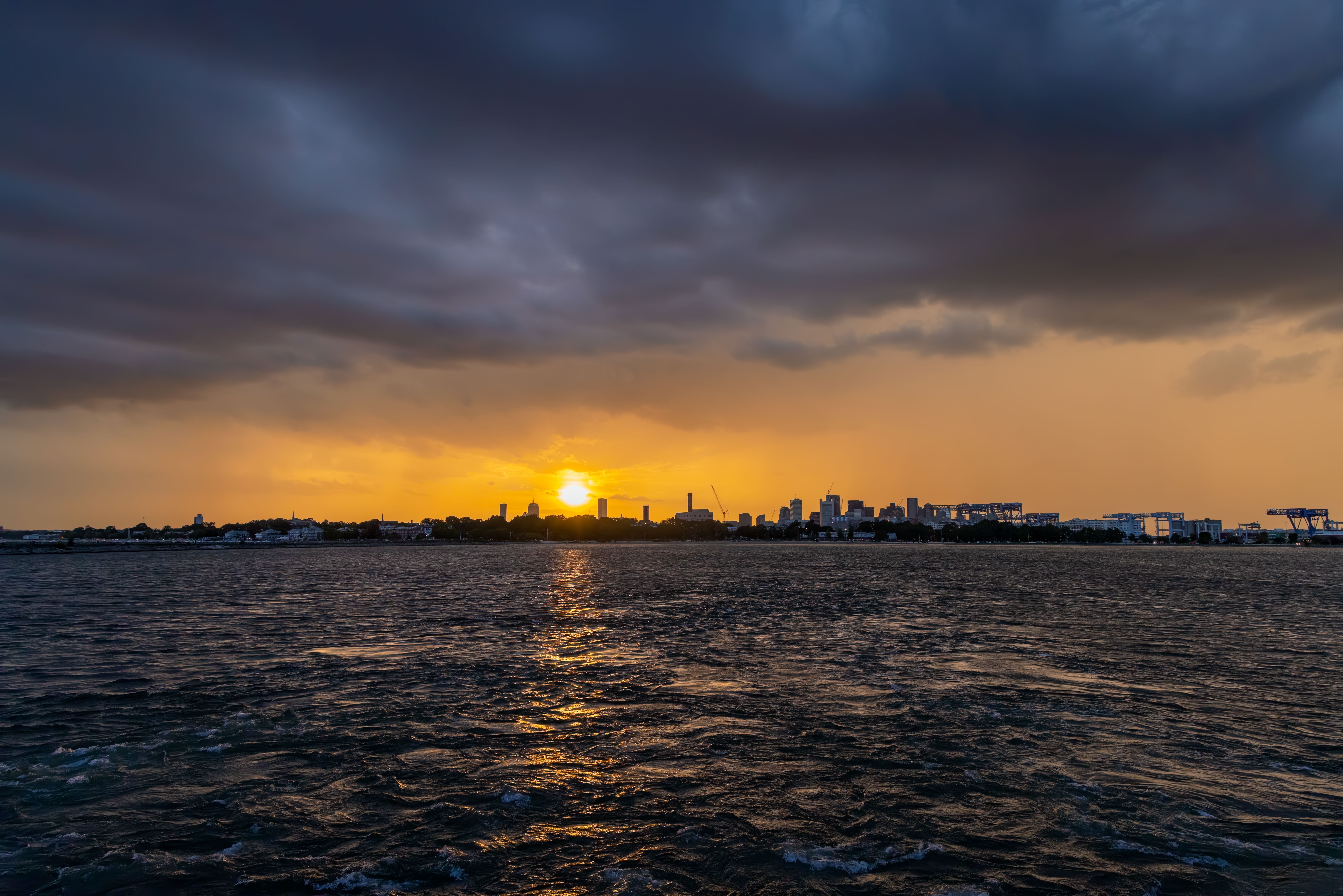 Scenic Boston Harbor Sunset with City Skyline · Free Stock Photo