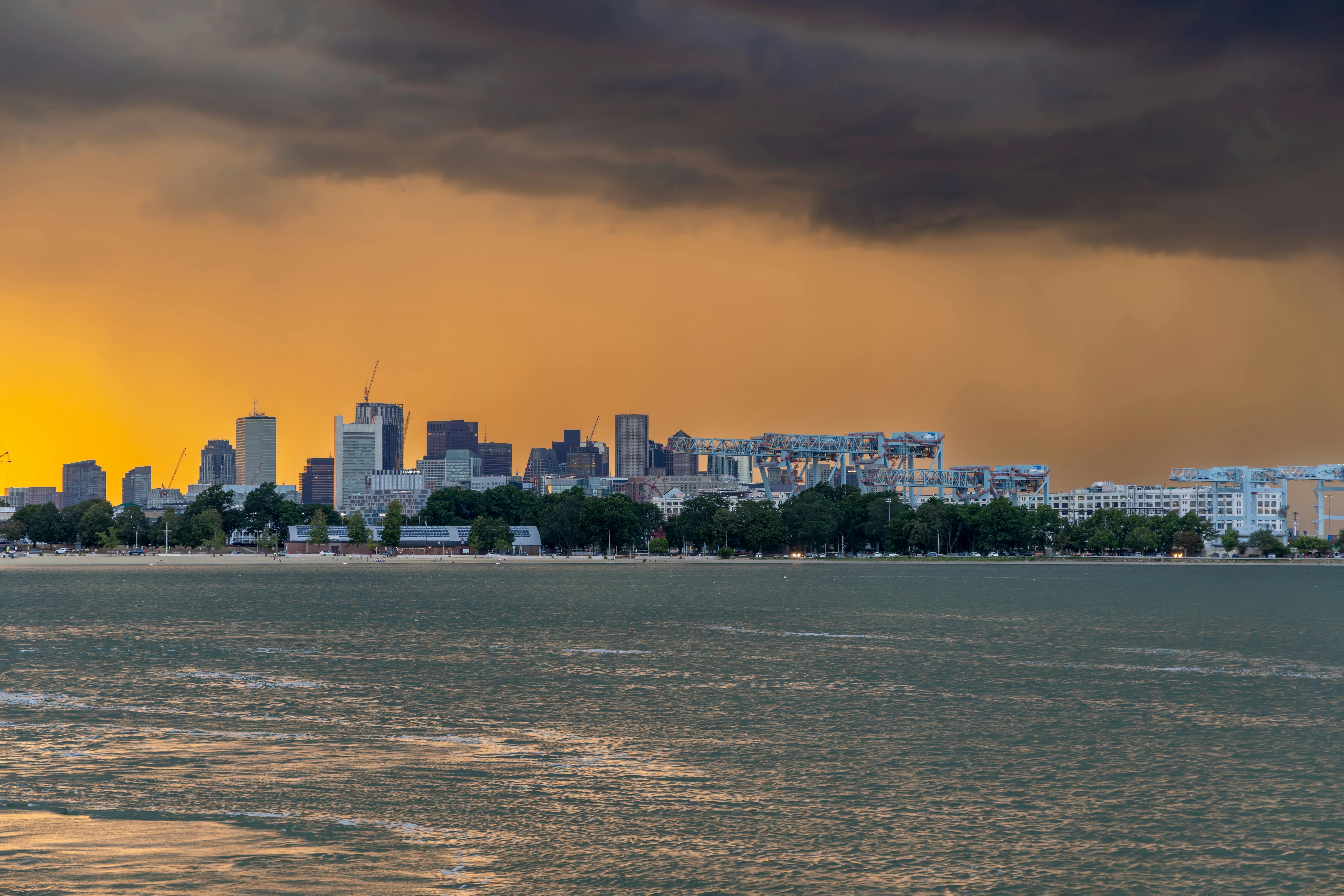 Boston Skyline at Sunset with Dramatic Sky · Free Stock Photo