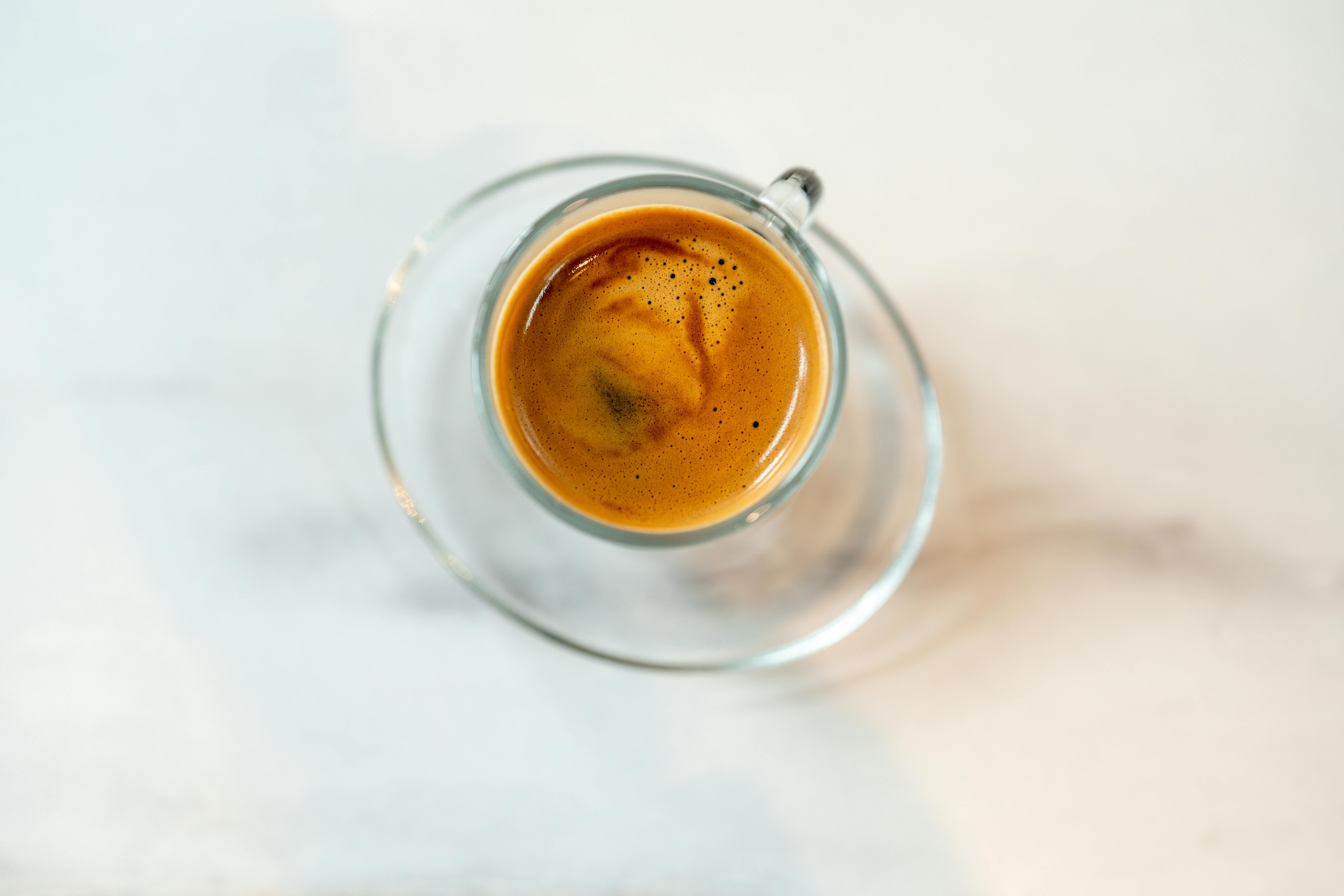 Top View of Freshly Brewed Espresso in Glass Cup · Free Stock Photo