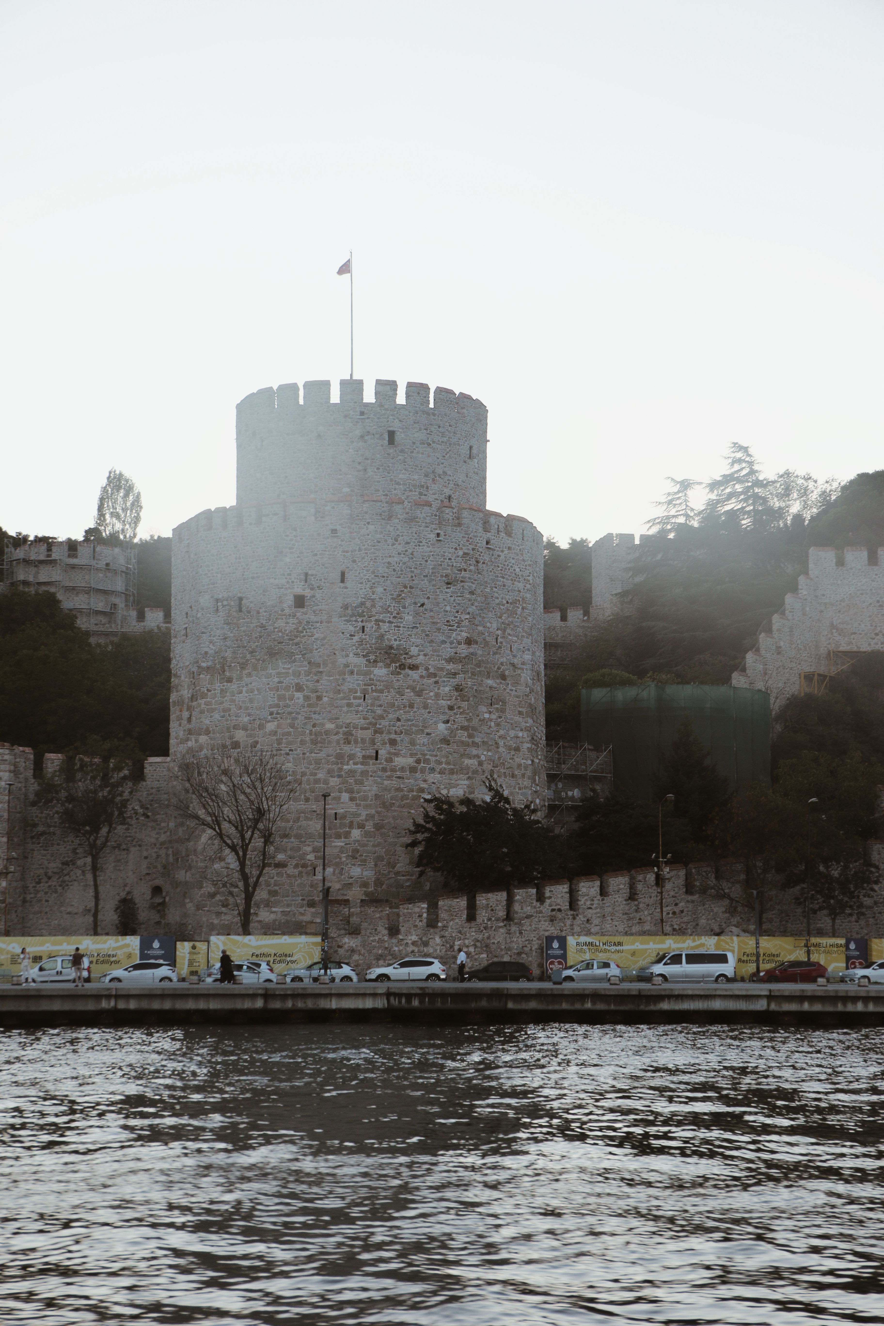 Historic Fortress Tower by Waterfront · Free Stock Photo