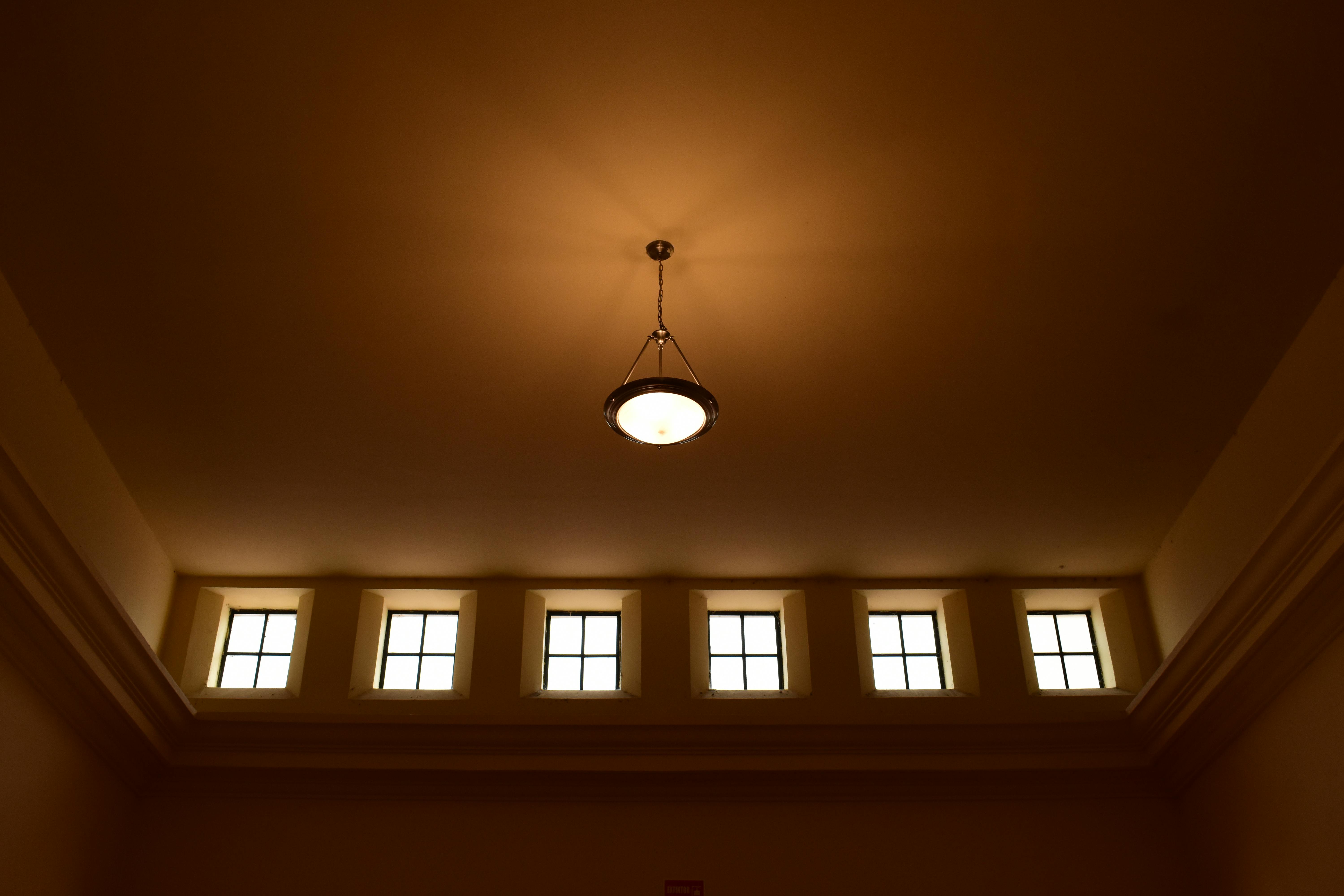 Elegant Ceiling Light in Dimly Lit Room · Free Stock Photo