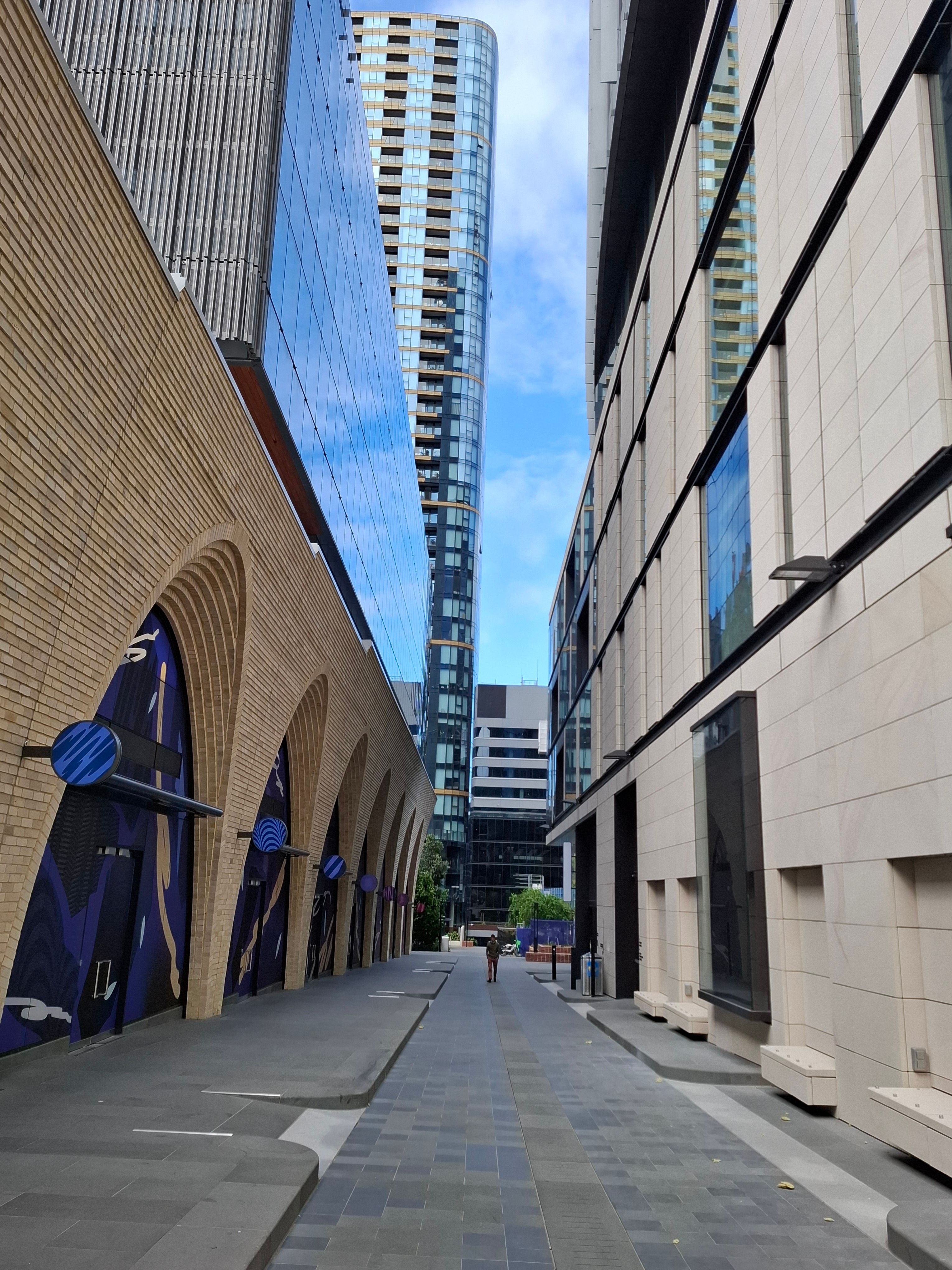 Modern Urban Street with High-Rise Buildings · Free Stock Photo