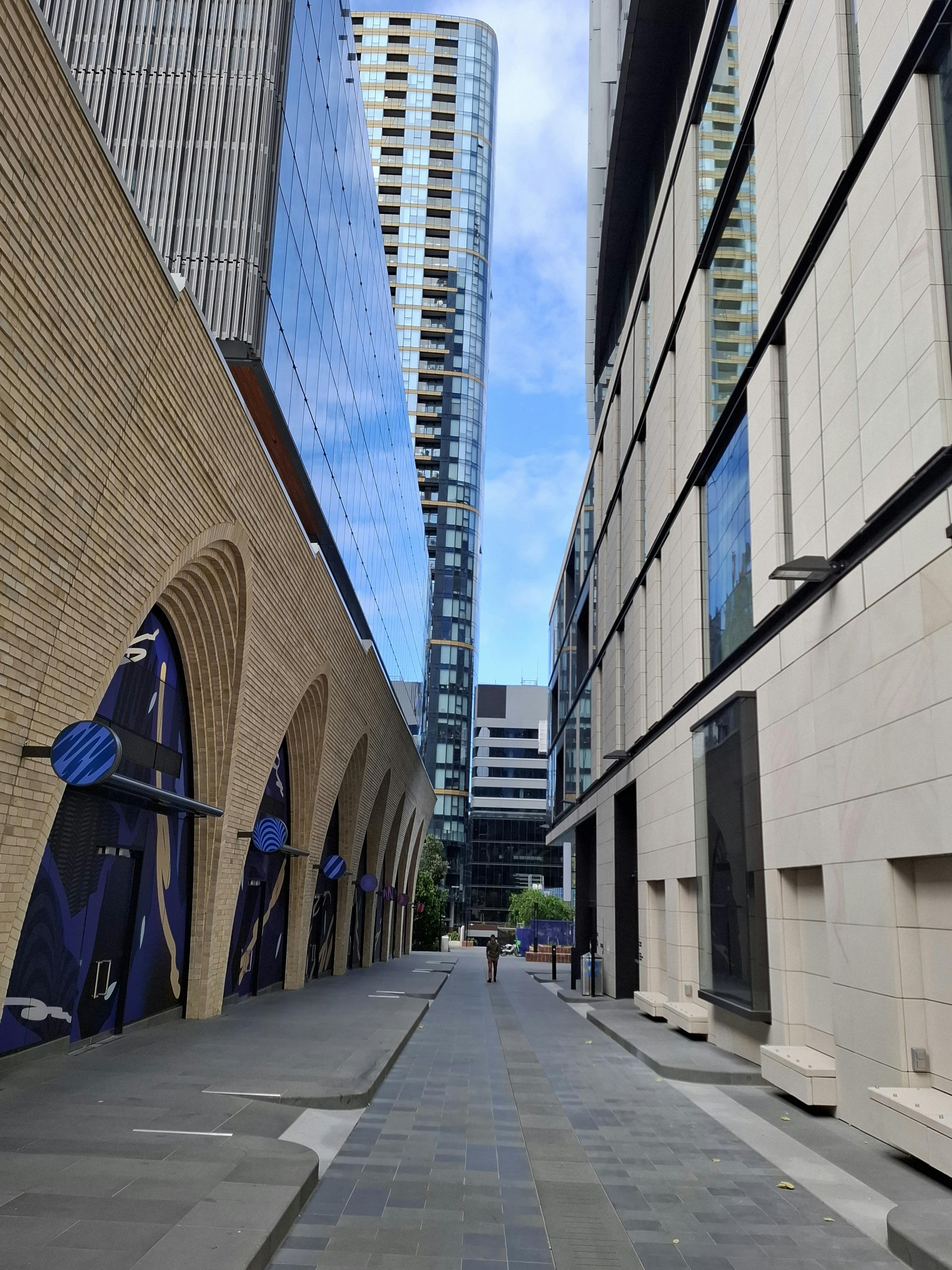 Modern Urban Street with High-Rise Buildings · Free Stock Photo