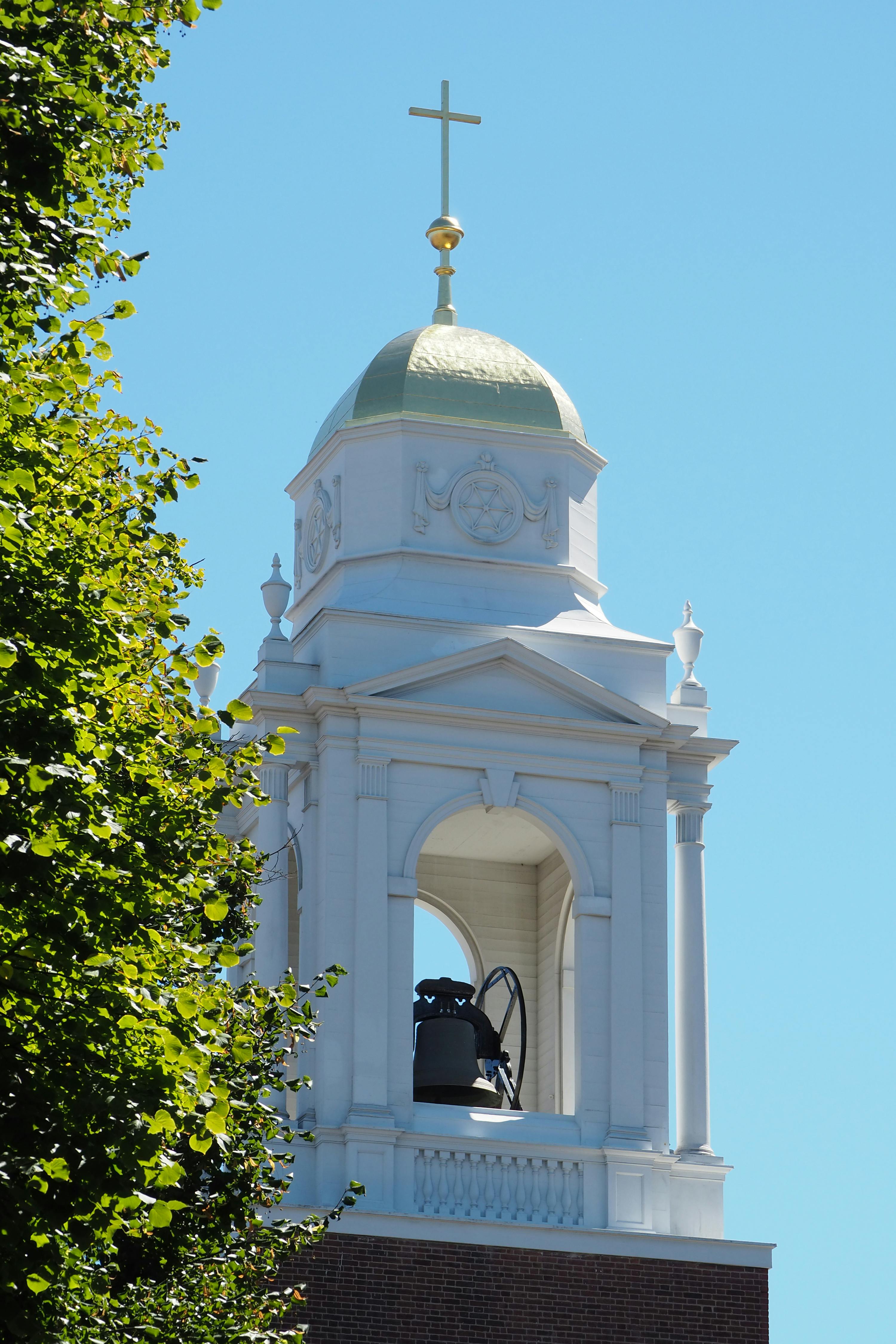 Historic Bell Tower Against Clear Blue Sky · Free Stock Photo