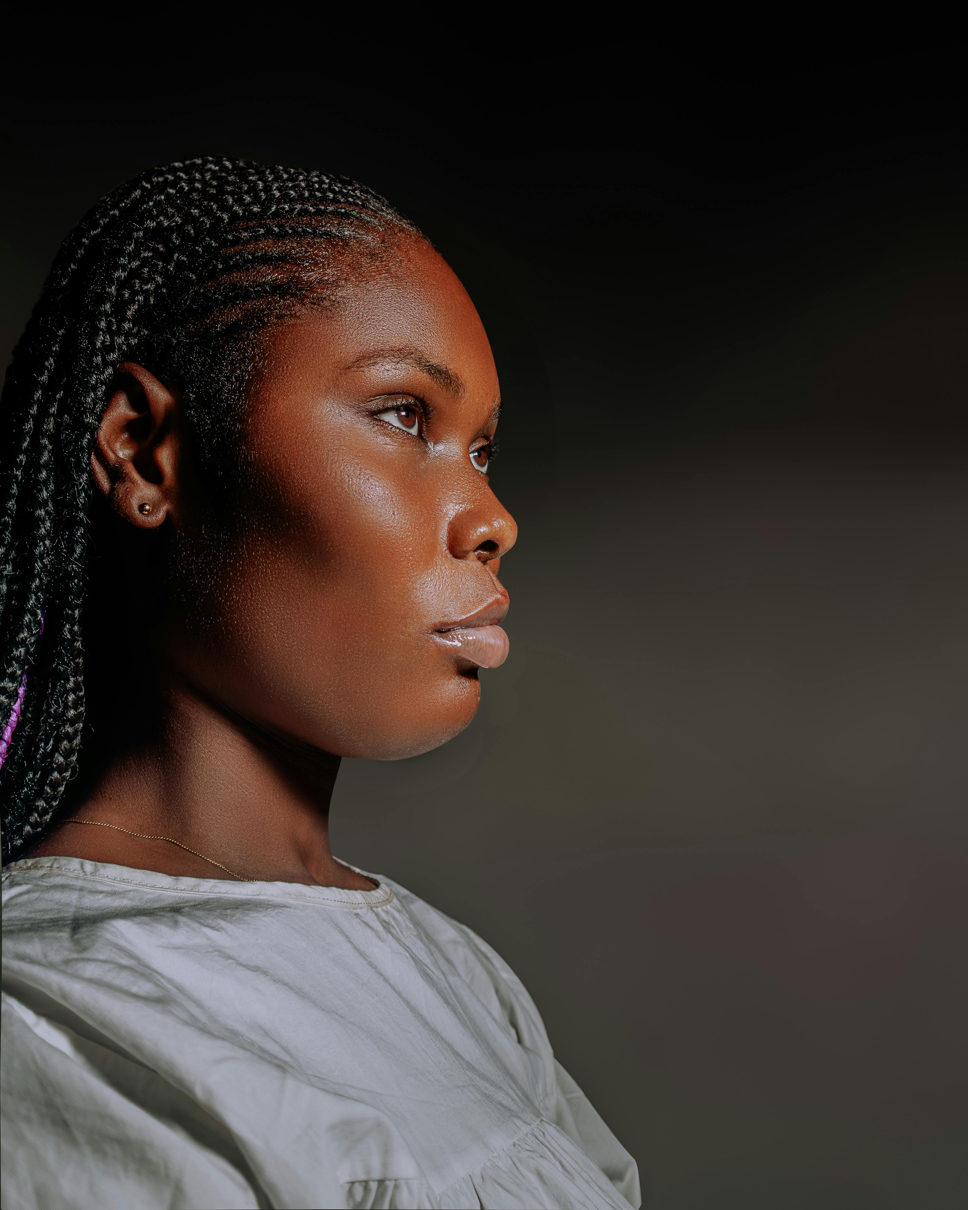 Elegant Portrait of a Black Woman in Profile · Free Stock Photo