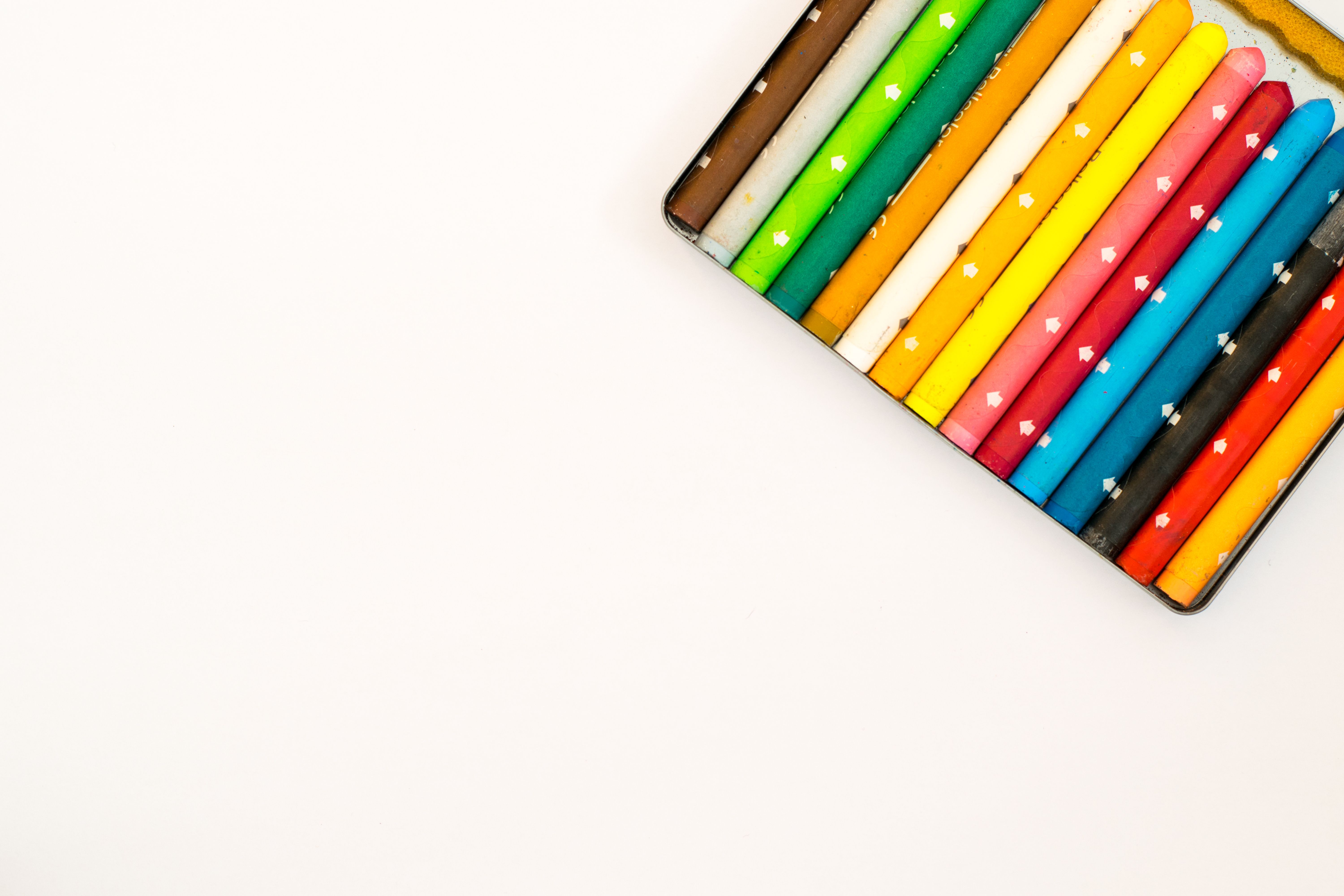 Multi Colored Pencils over White Background · Free Stock Photo