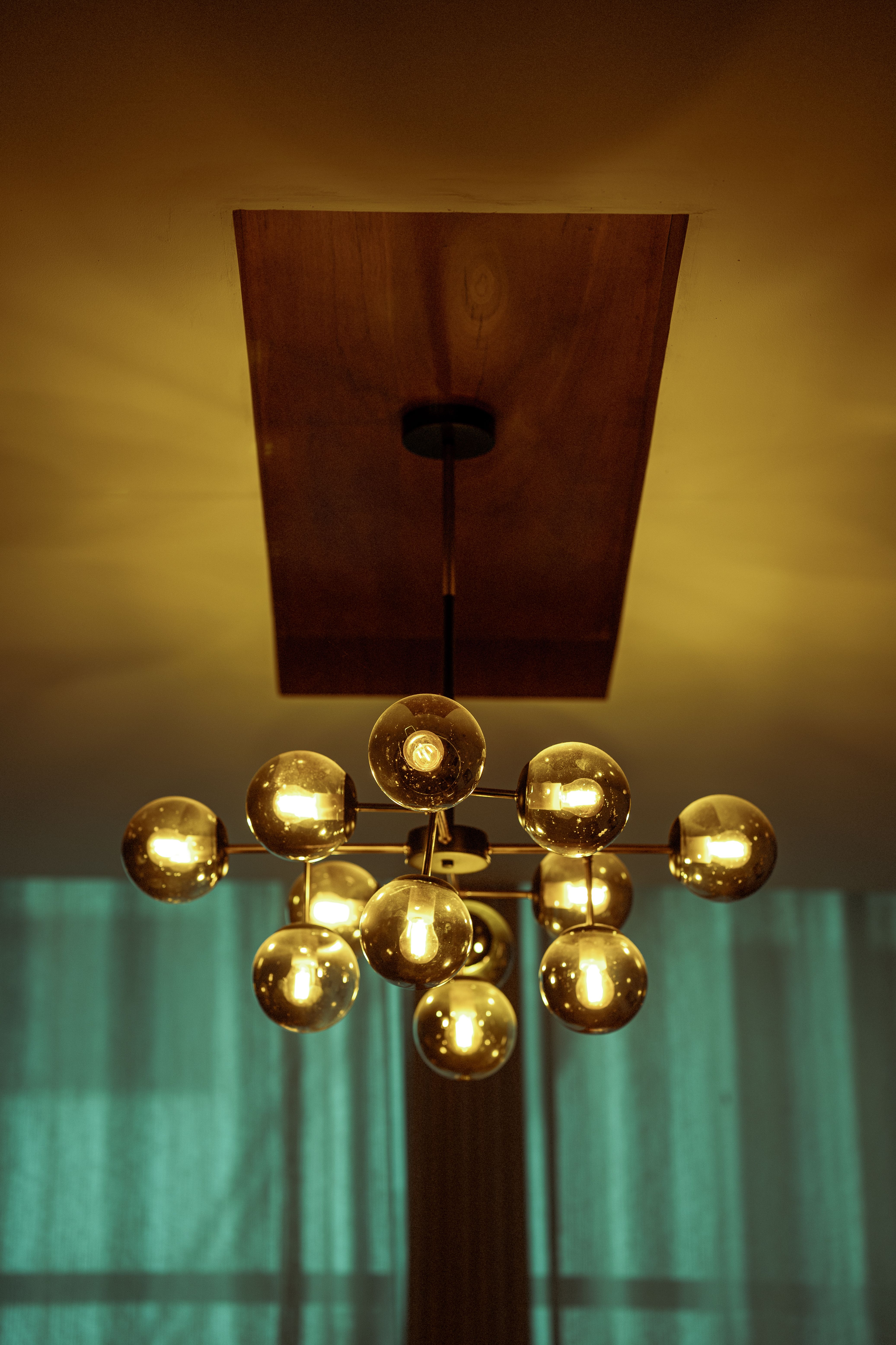 Modern Chandelier with Warm Lighting in Interior Design · Free Stock Photo