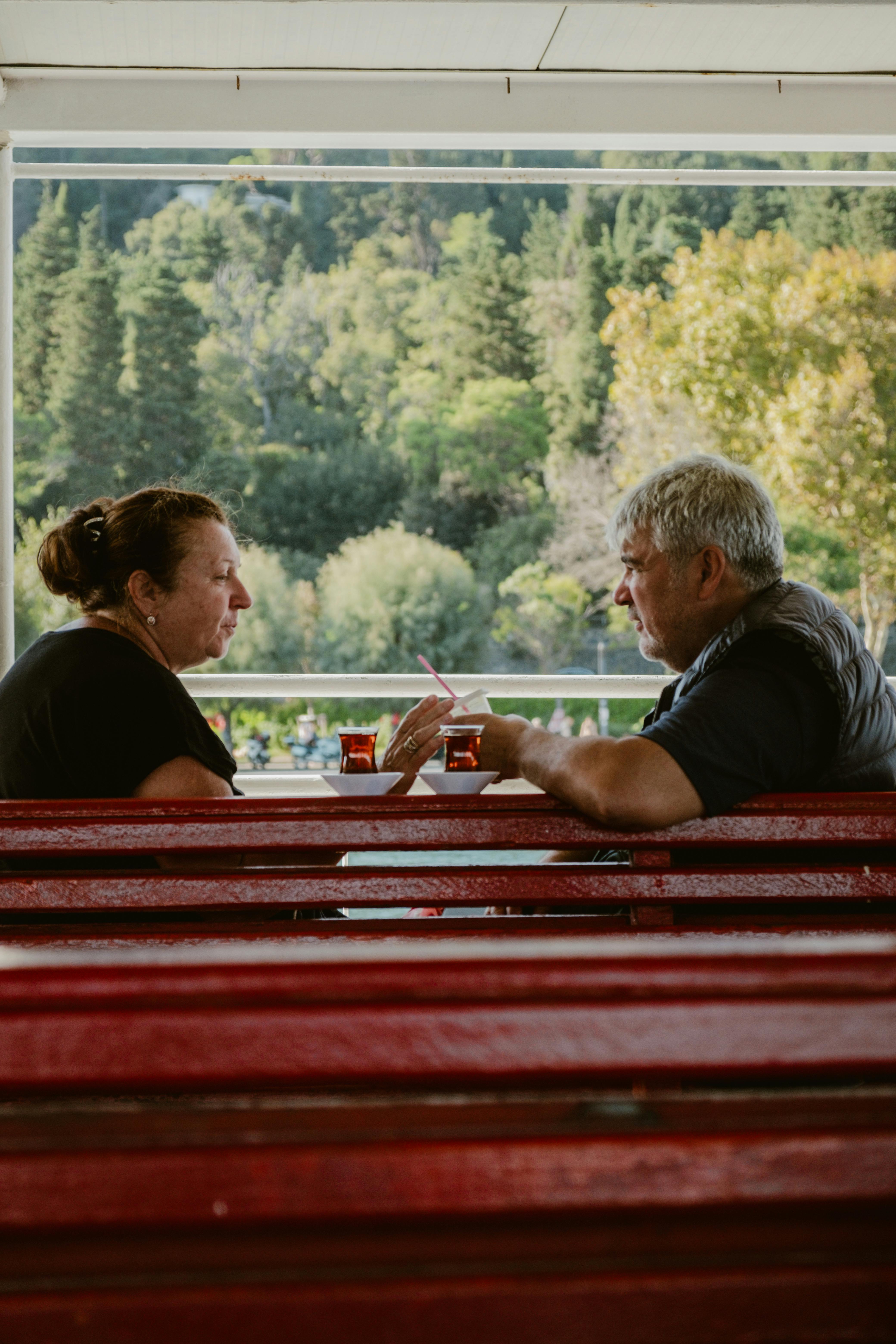 Conversation Over Tea on Istanbul Ferry · Free Stock Photo