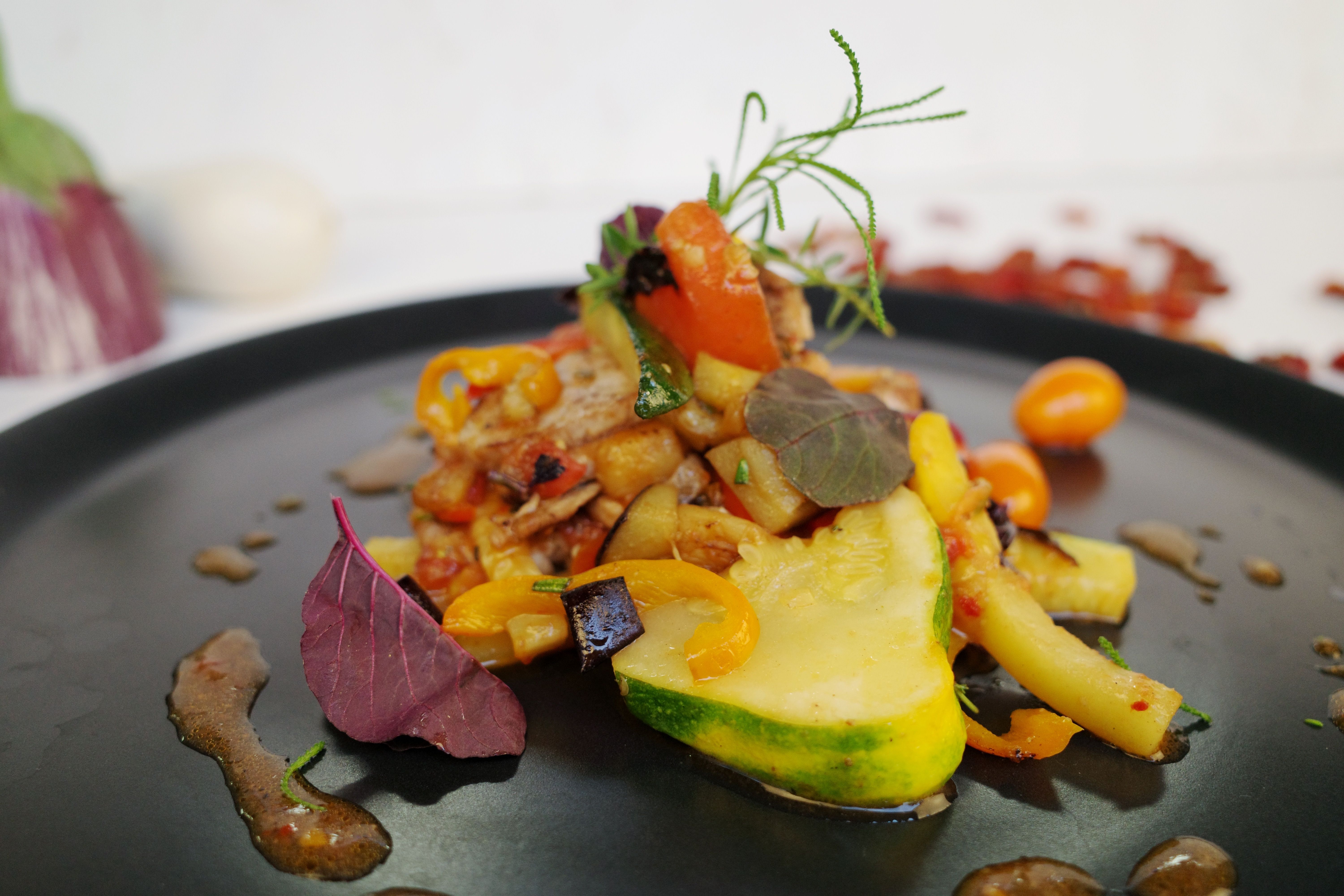 Gourmet Vegetable Dish with Zucchini and Peppers · Free Stock Photo