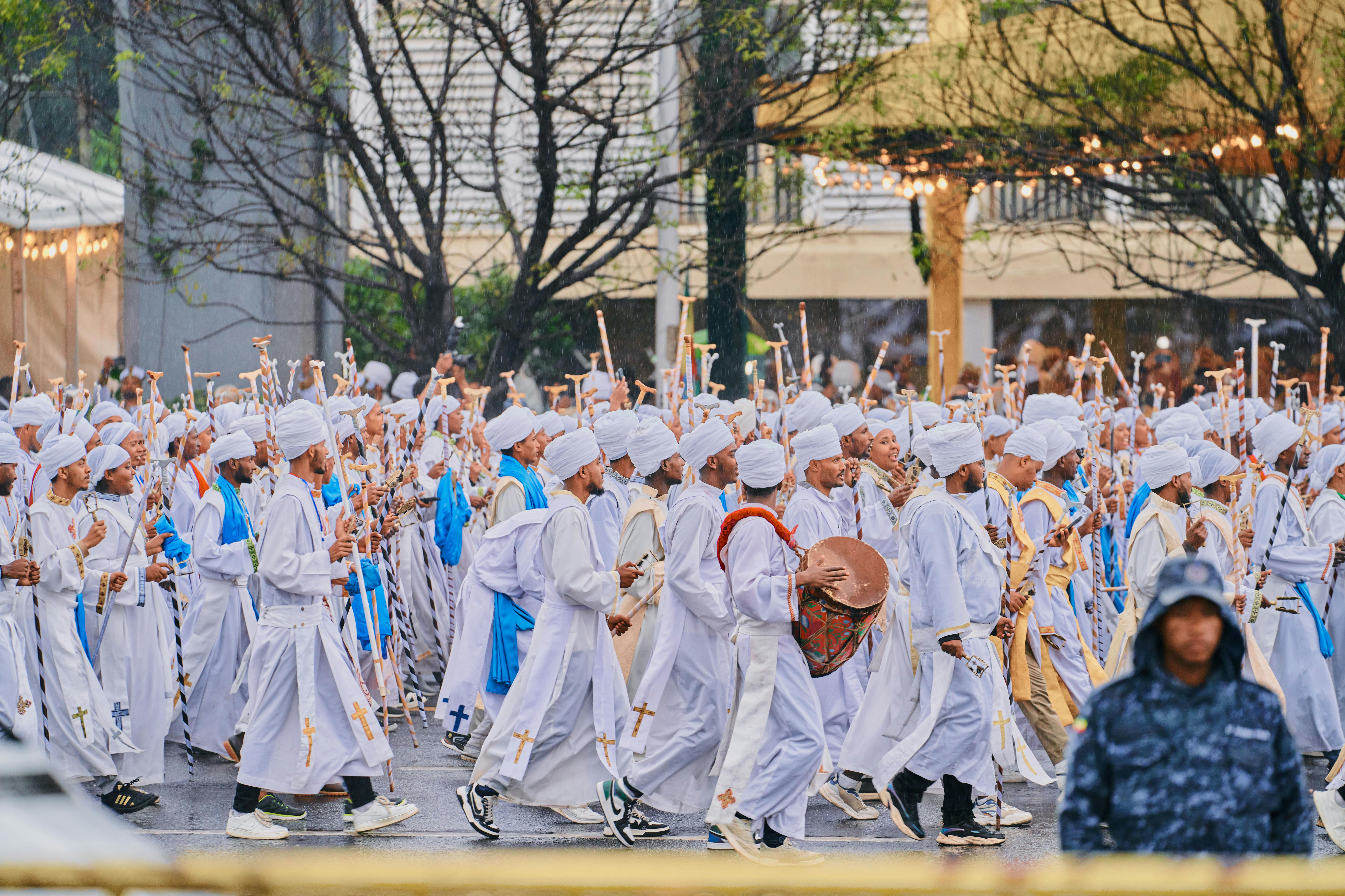 Traditional Religious Parade in Vibrant Rain · Free Stock Photo