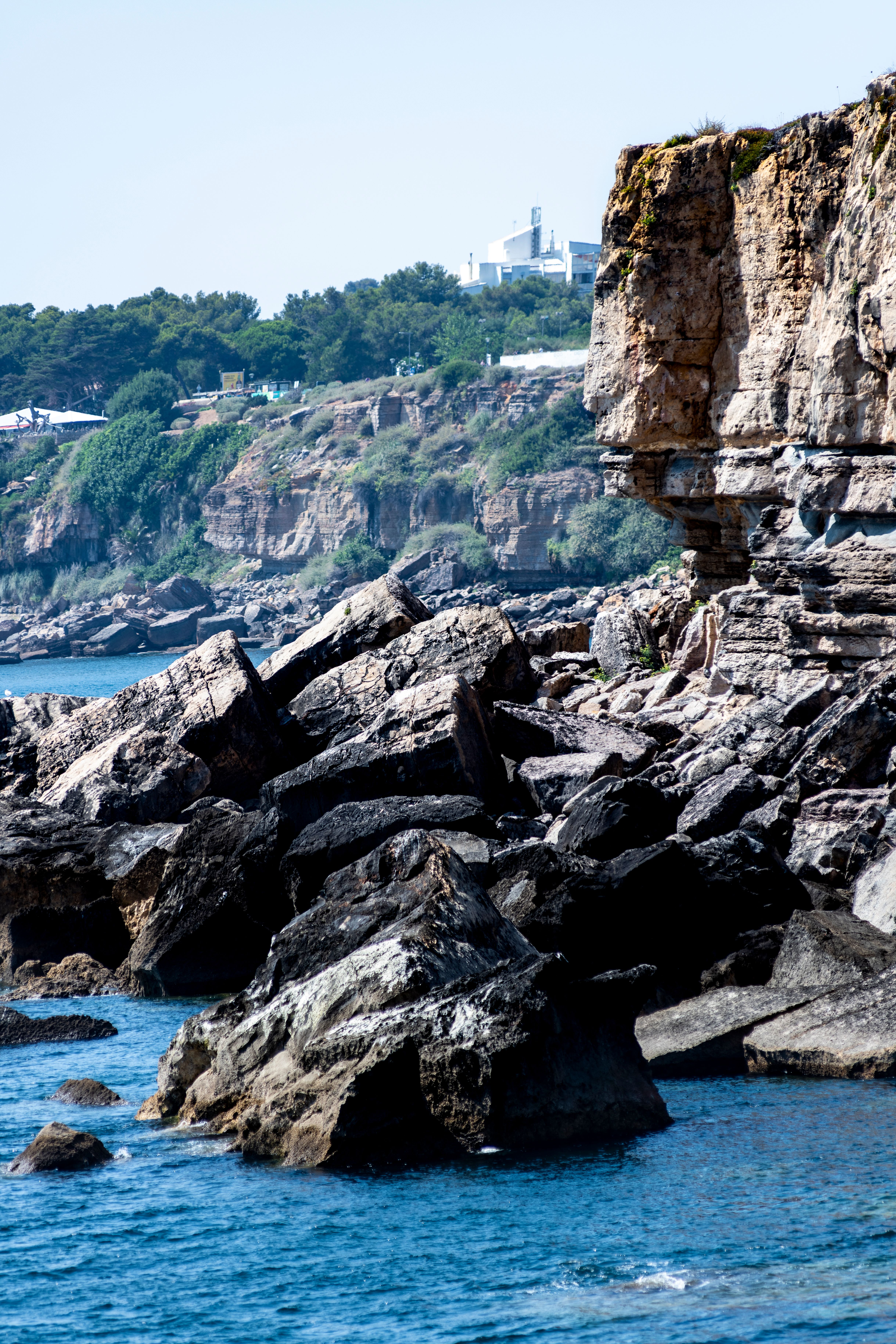 Rugged Cliffs and Rocky Shoreline in Cascais · Free Stock Photo
