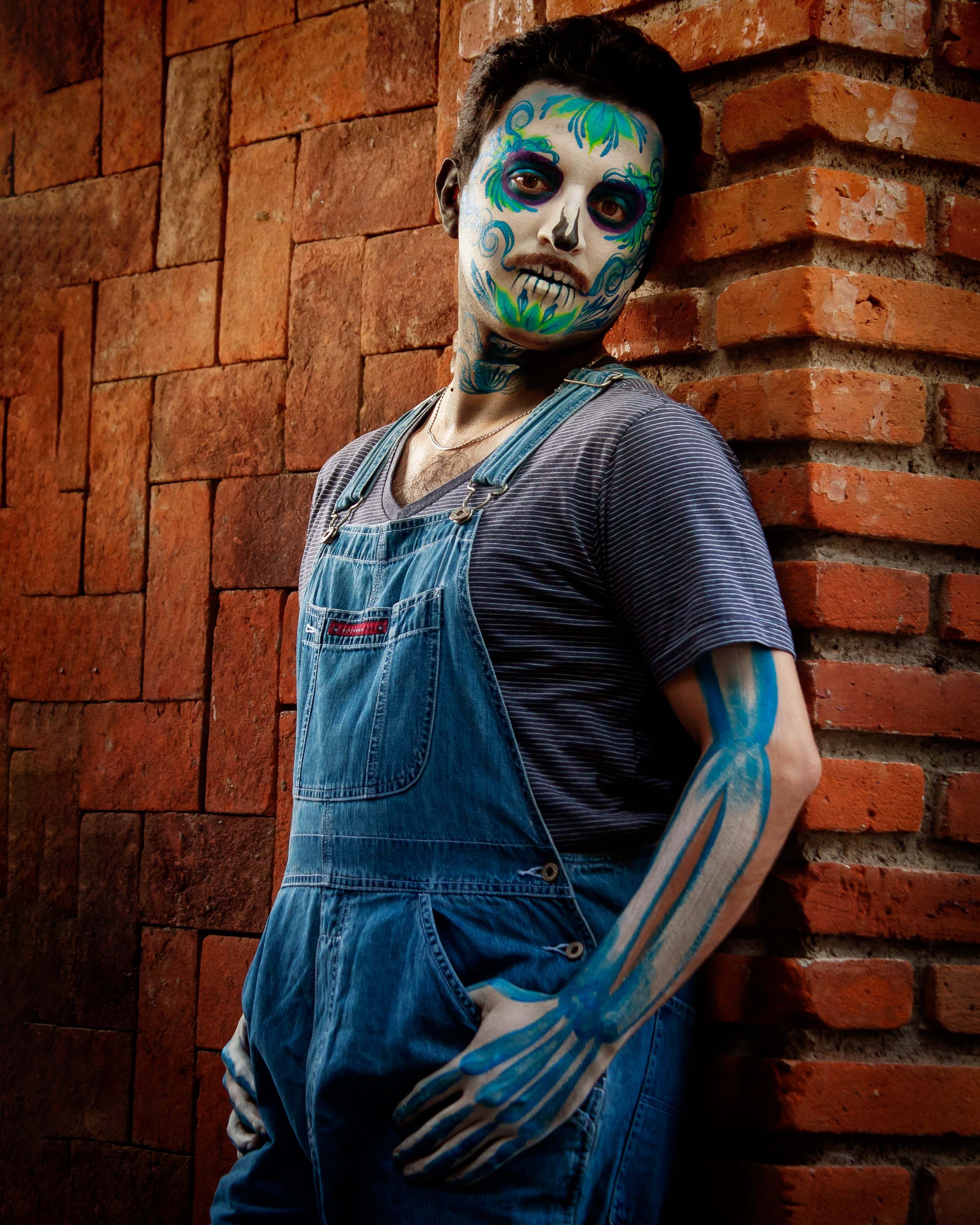 Portrait of Person with Vibrant Skeleton Face Paint · Free Stock Photo