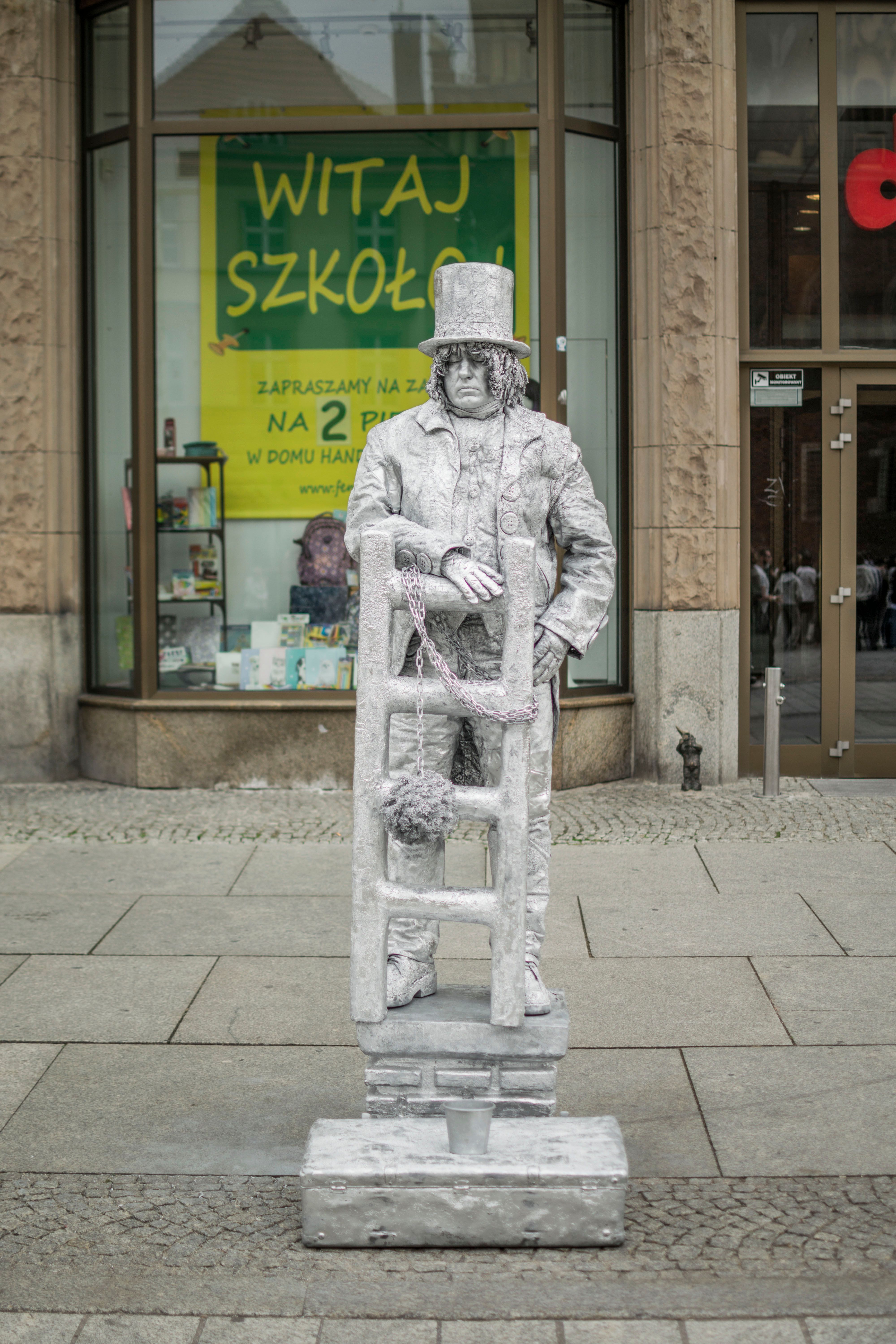 Street Performer as Silver Statue in Wrocław · Free Stock Photo