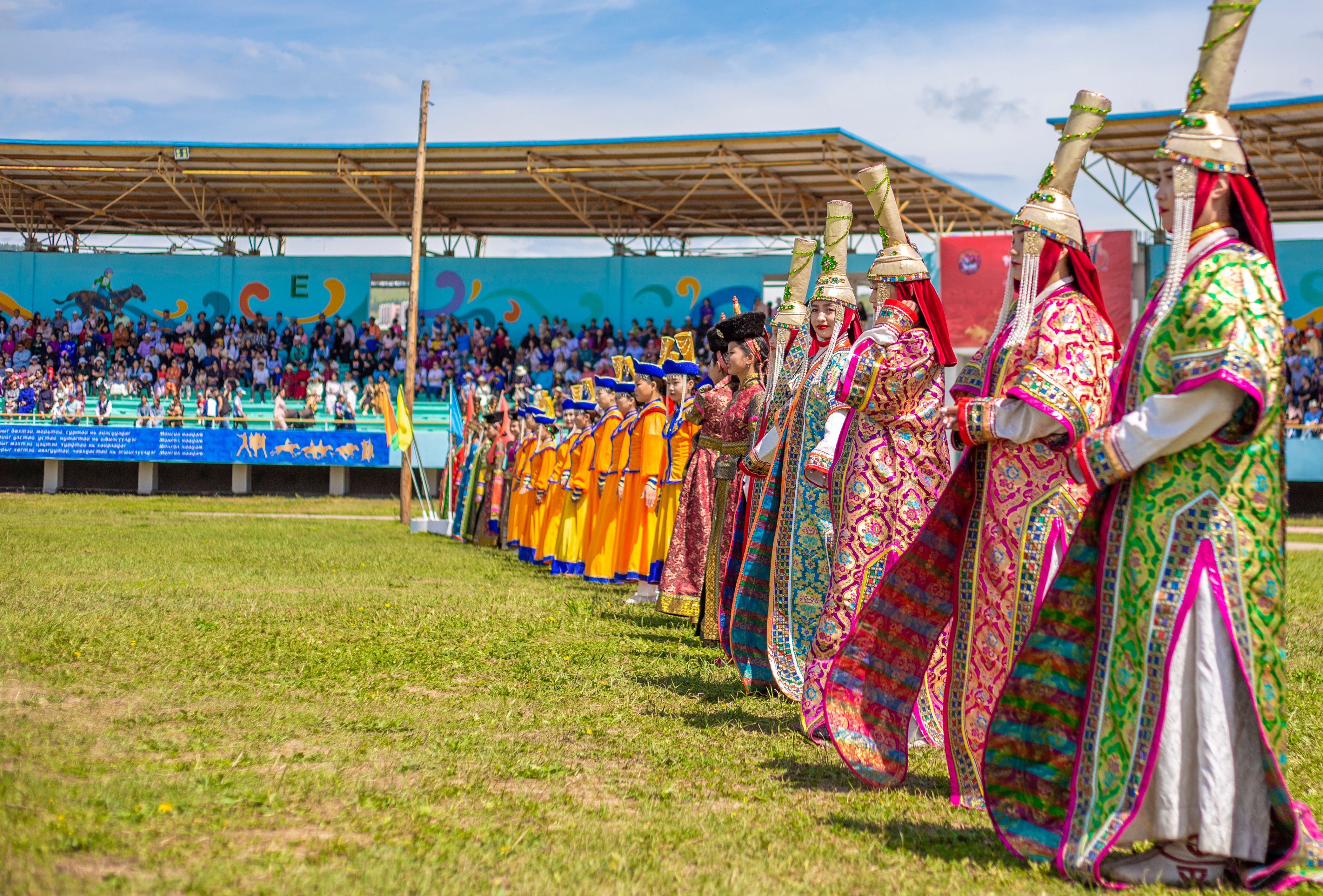 Traditional Cultural Festival in Vibrant Costumes · Free Stock Photo