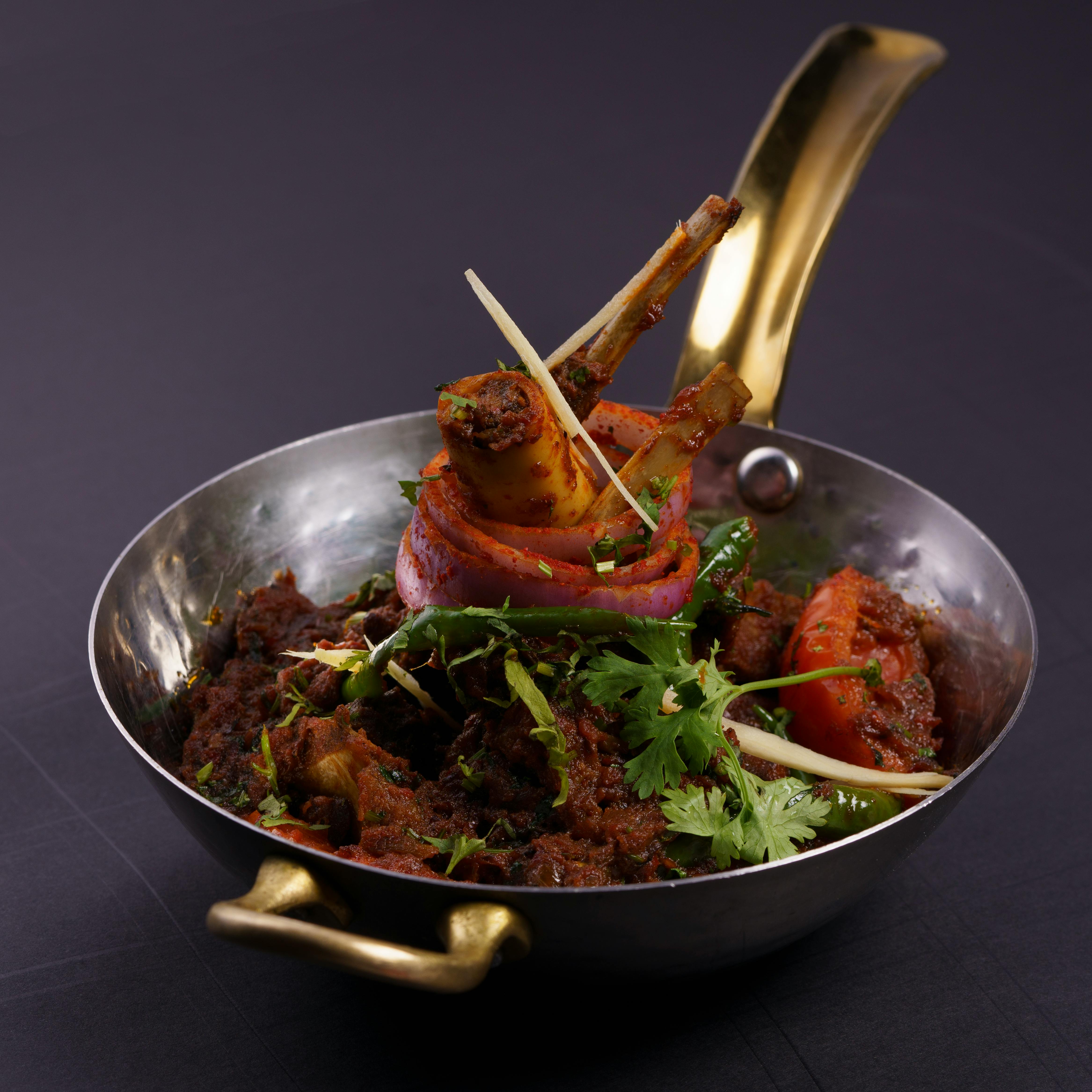 Authentic Indian Mutton Curry in Traditional Pan · Free Stock Photo