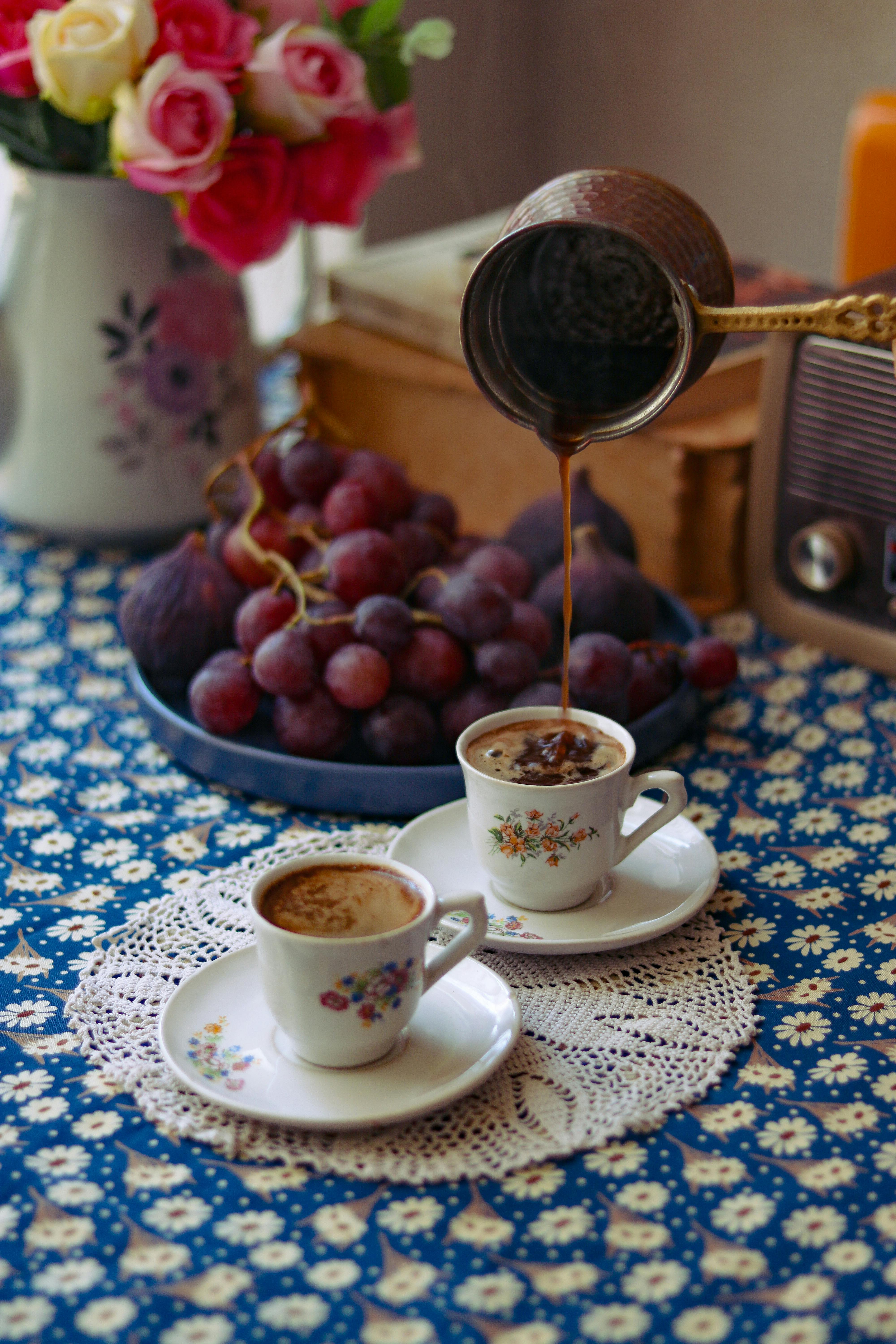 Vintage Coffee Setting with Grapes and Flowers · Free Stock Photo