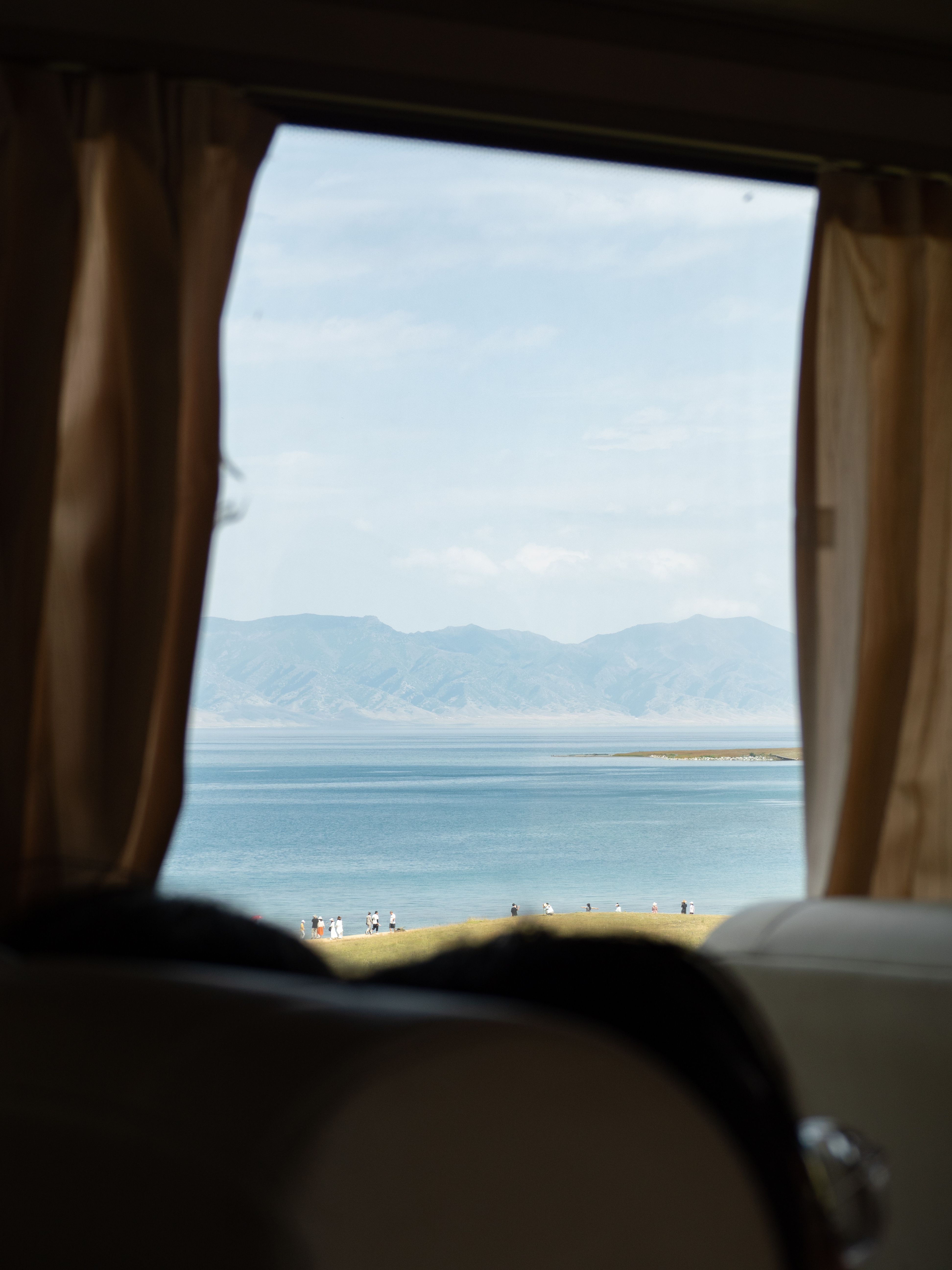 Scenic Lake View from a Train Window · Free Stock Photo