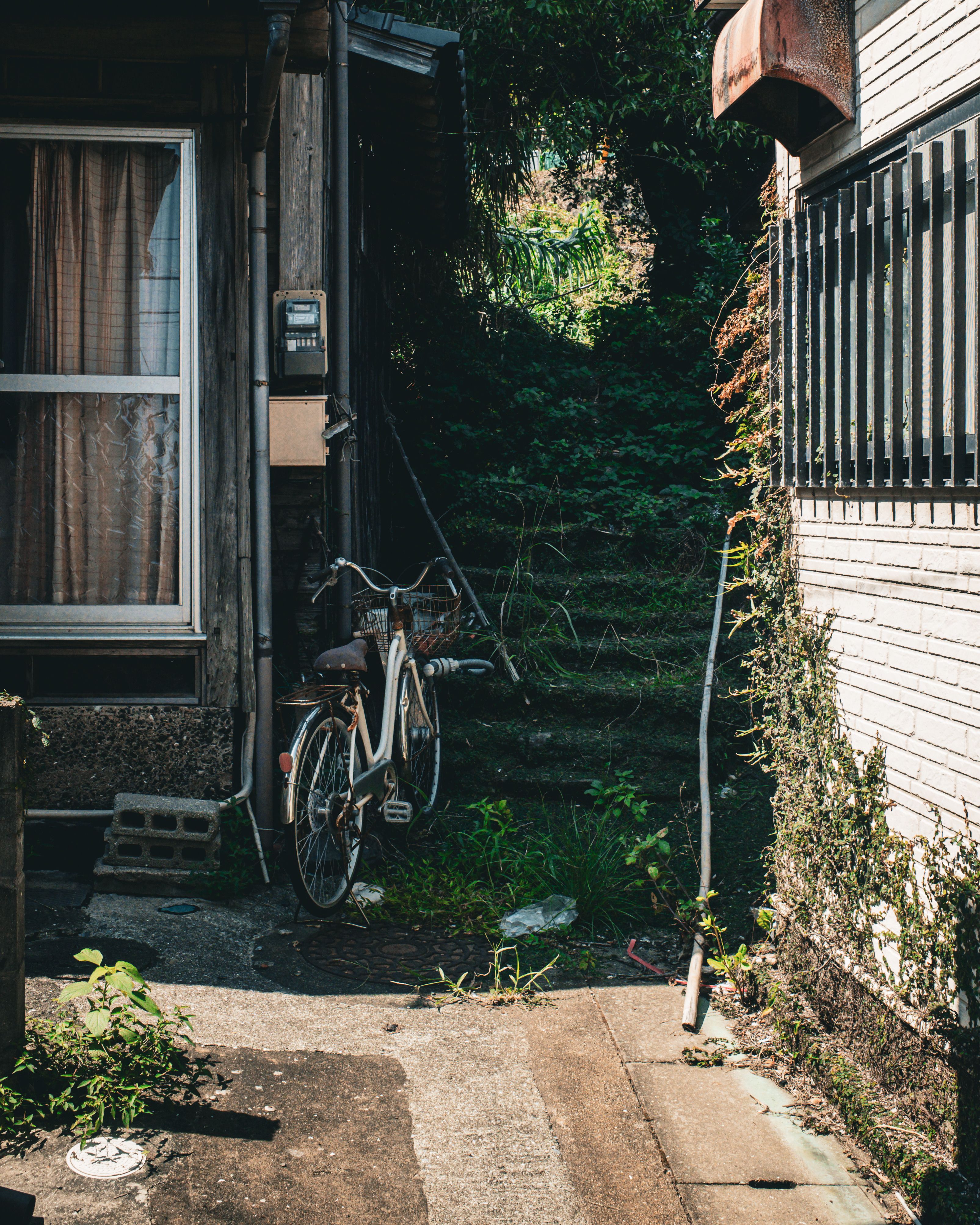 Rustic Japanese Alley with Bicycle in Shade · Free Stock Photo