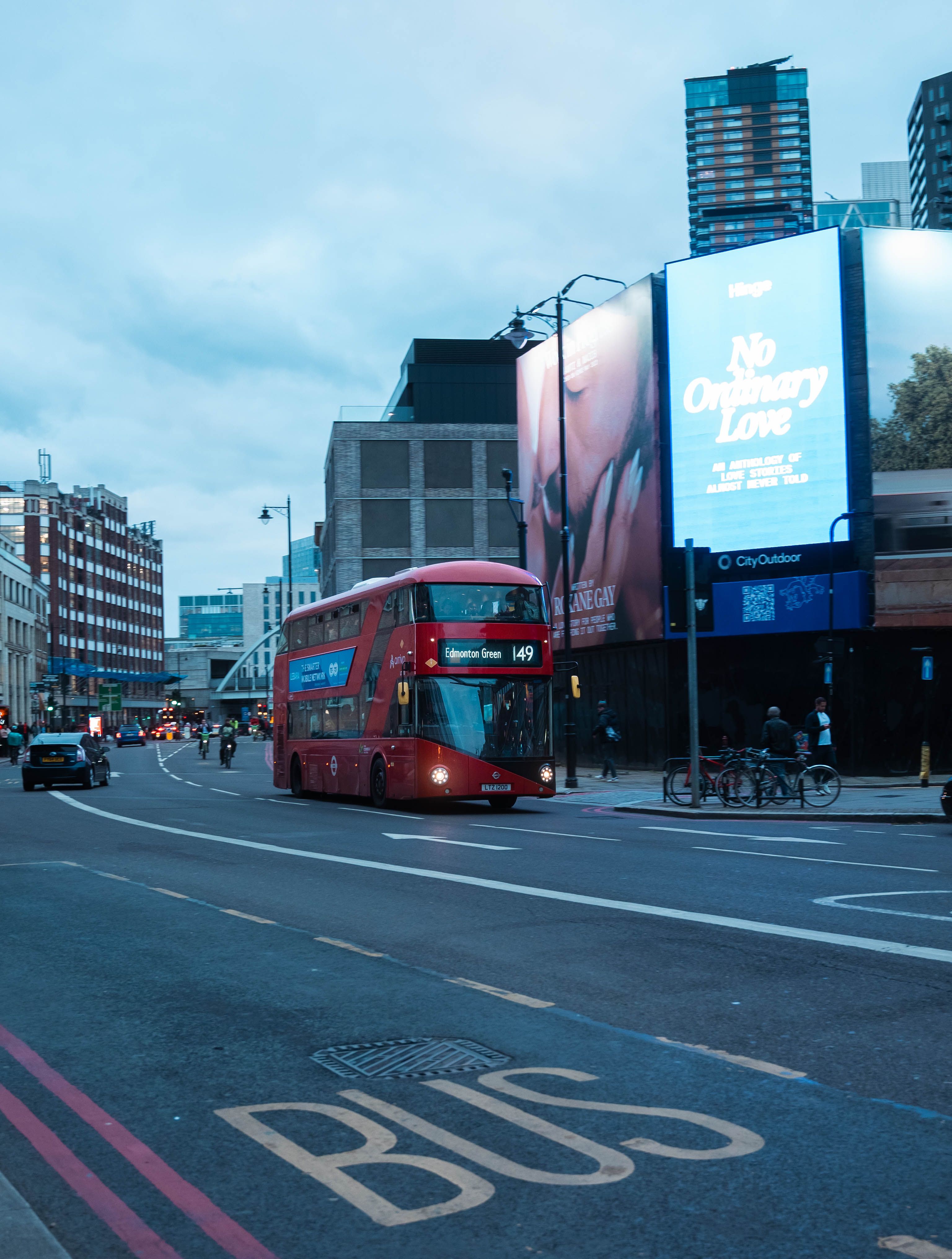 Iconic London Red Bus on Urban Street · Free Stock Photo