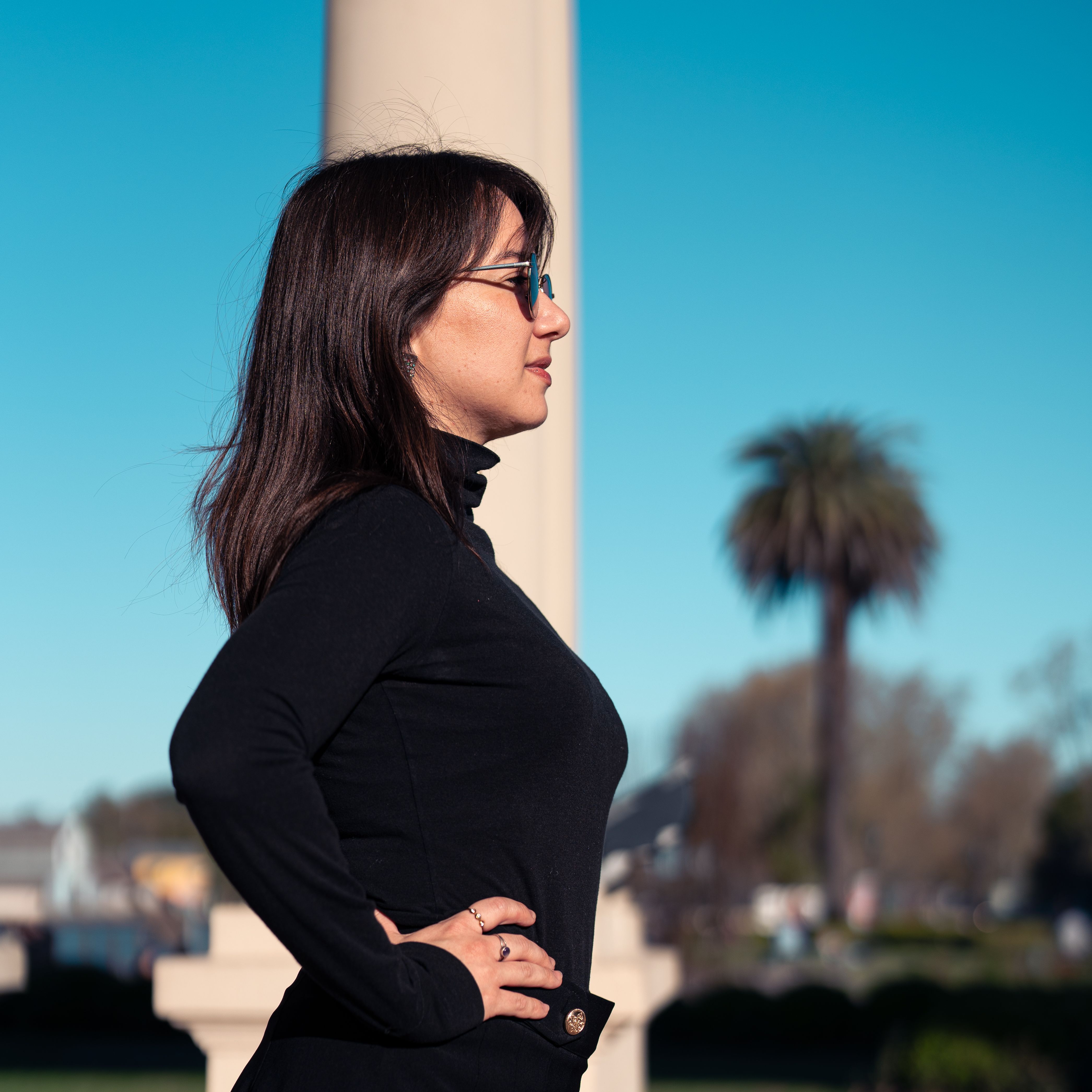 Profile Portrait of Woman in Black Outdoors · Free Stock Photo