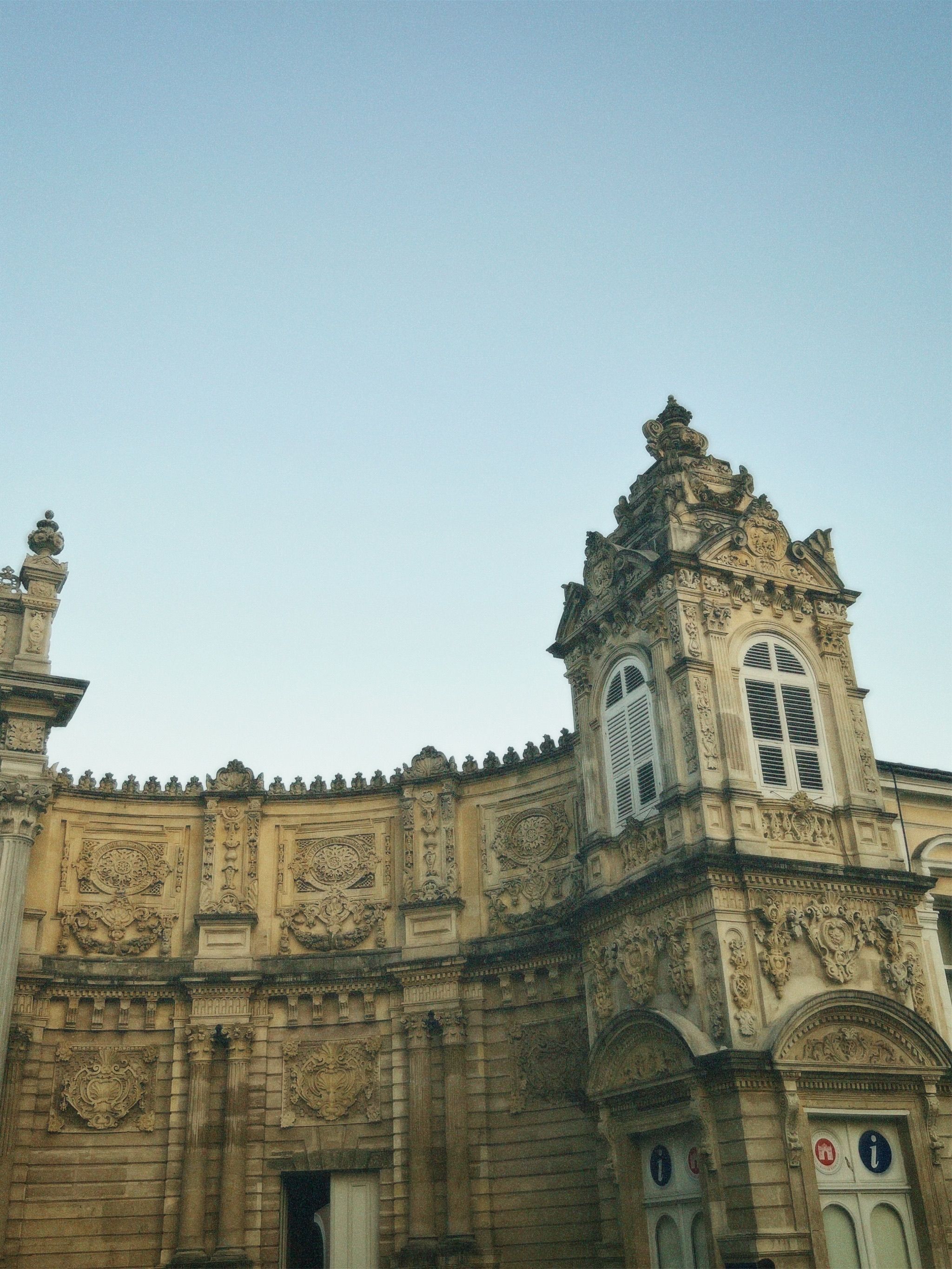 Ornate Historic Architecture with Detailed Facade · Free Stock Photo