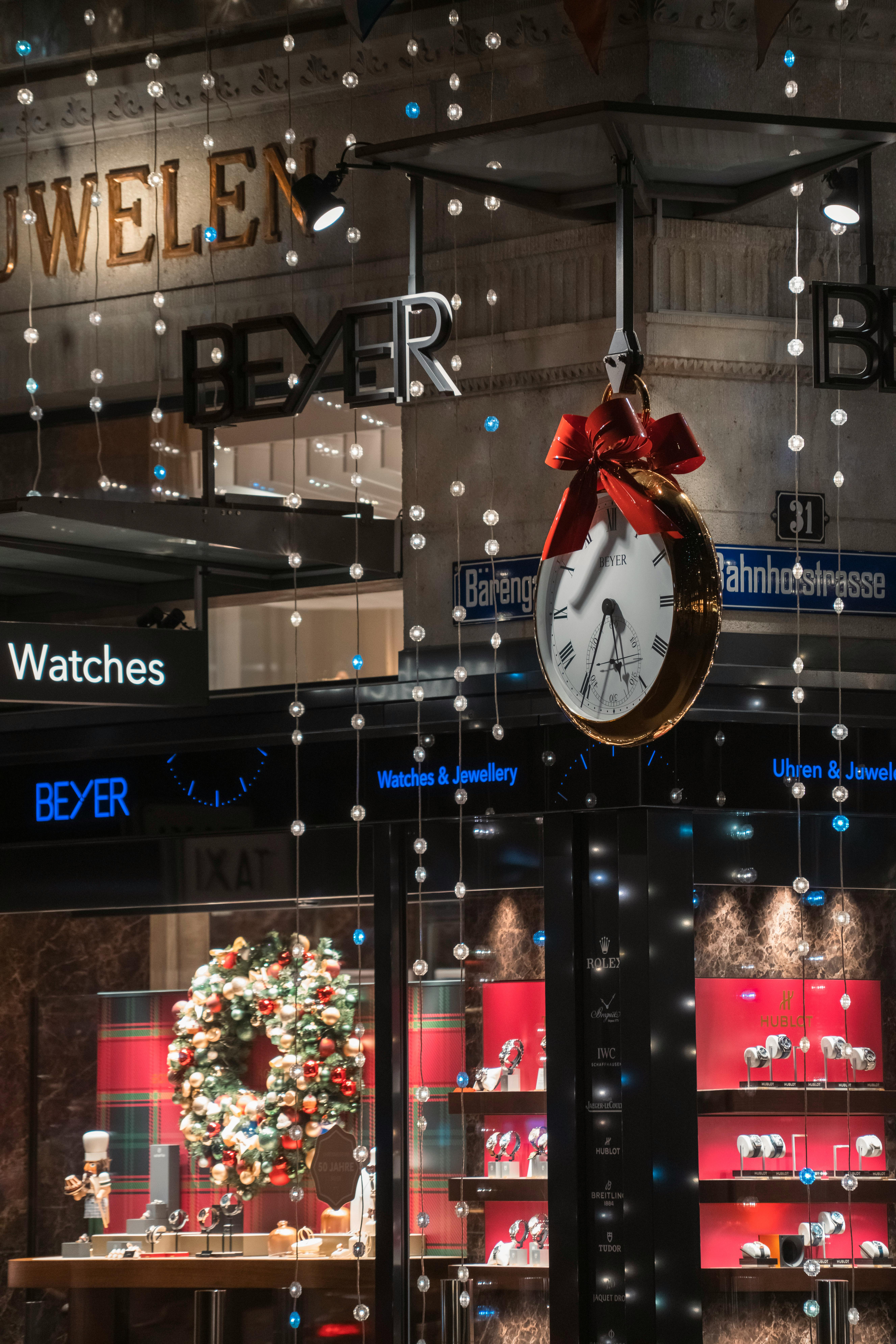 Festive Clock Display in Jewelry Storefront · Free Stock Photo