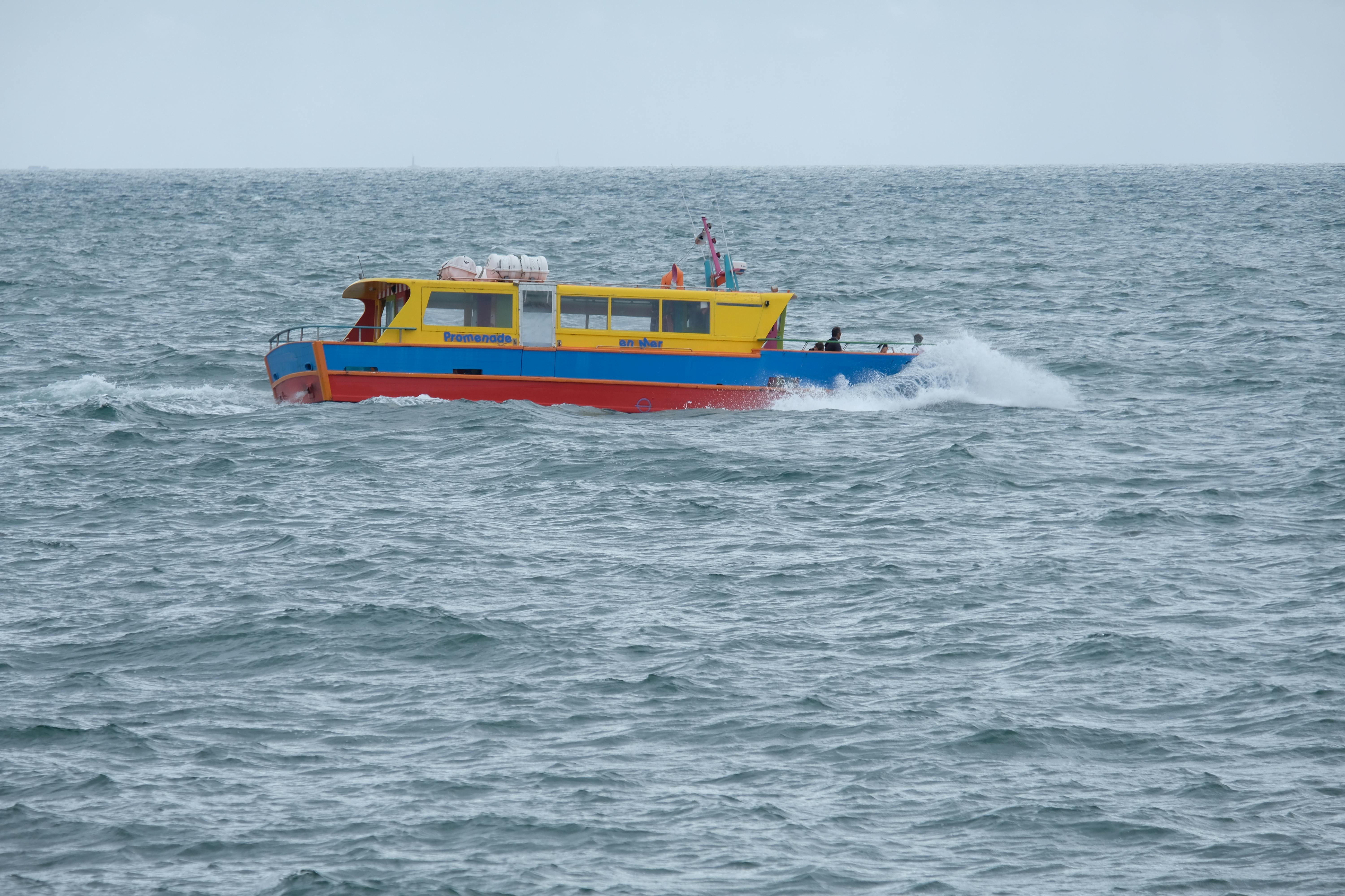 Colorful Tourist Boat on a Sea Excursion · Free Stock Photo