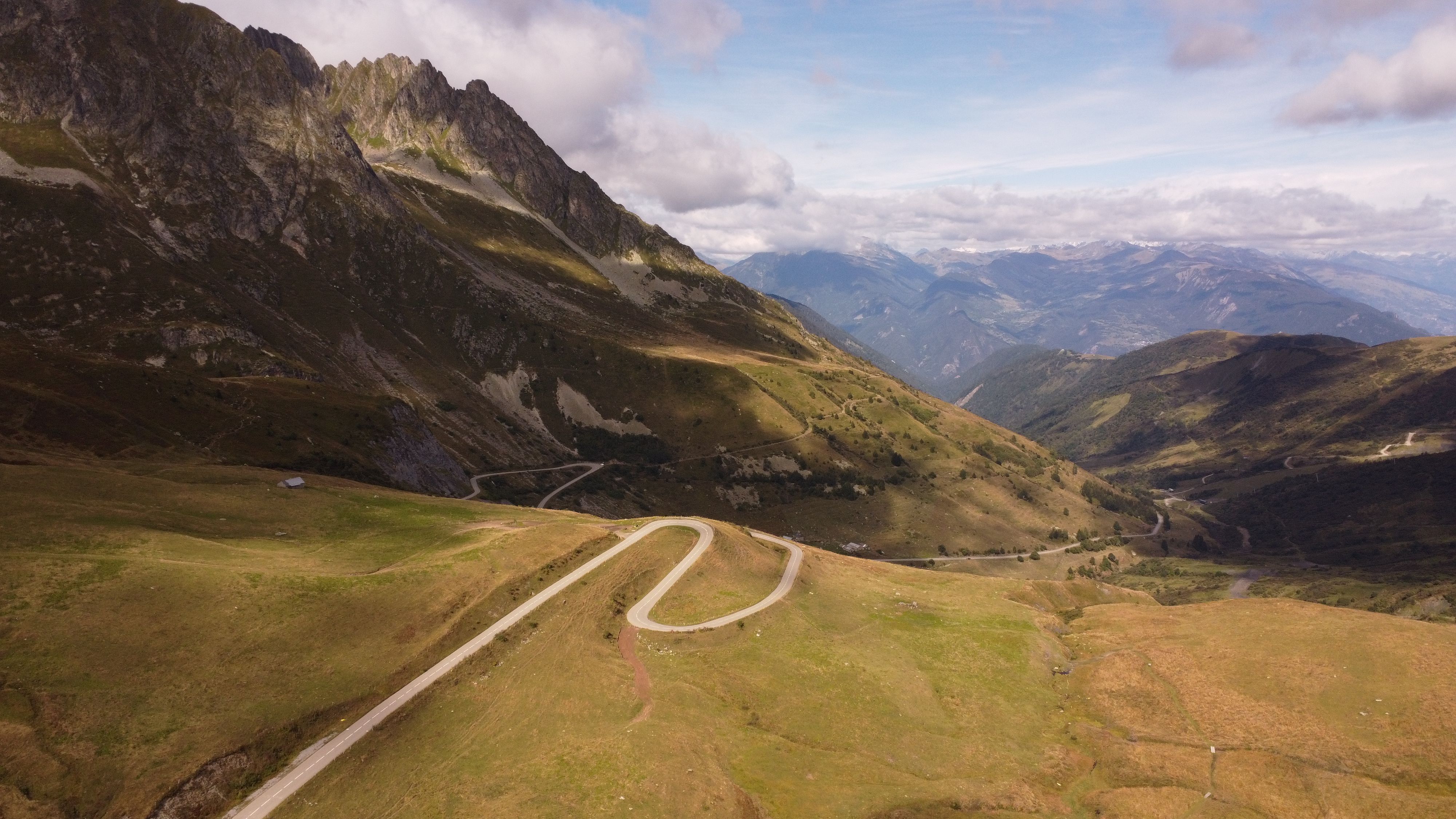 Drone View of Alpine Road through French Alps · Free Stock Photo