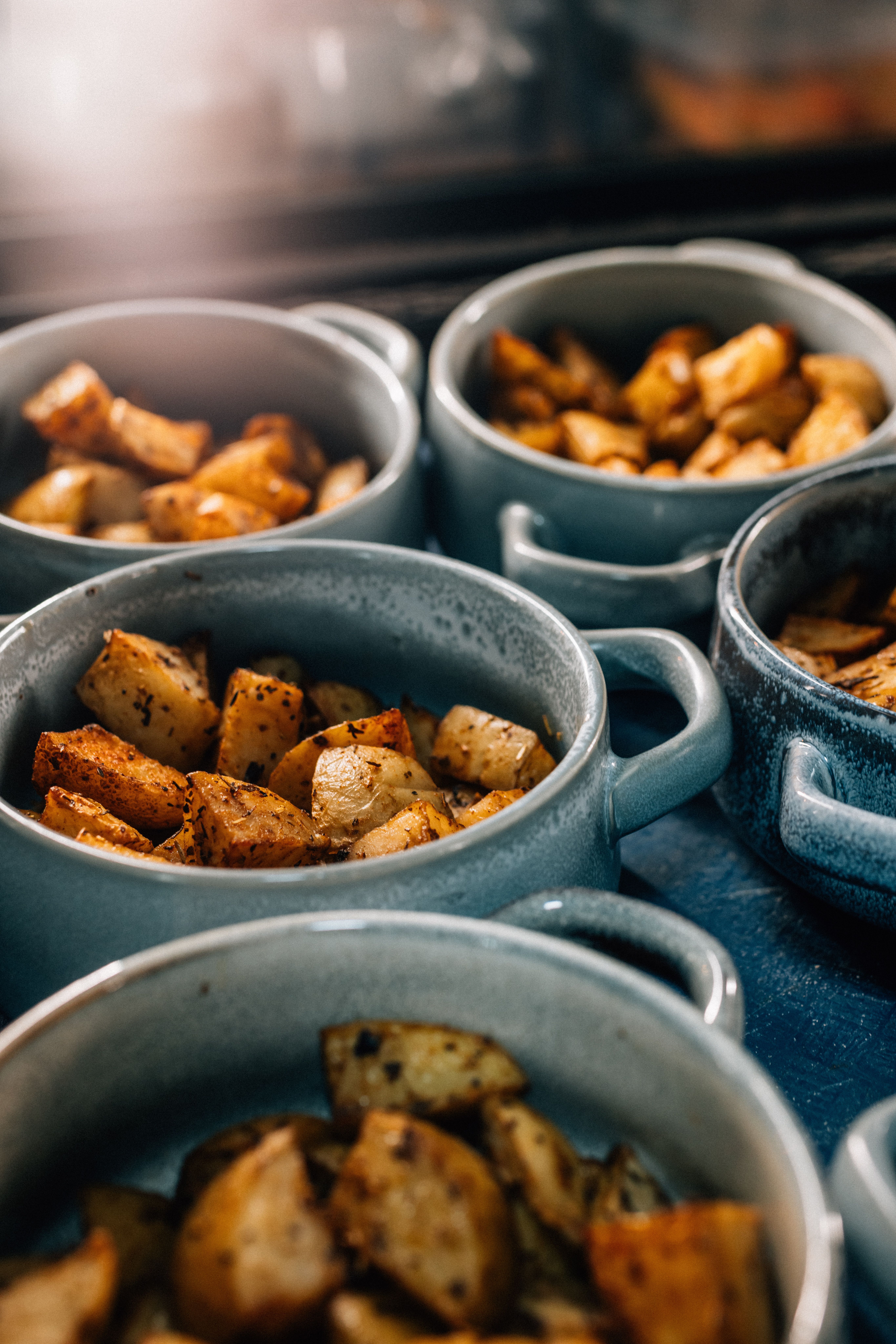 Roasted Potatoes in Blue Ceramic Bowls · Free Stock Photo