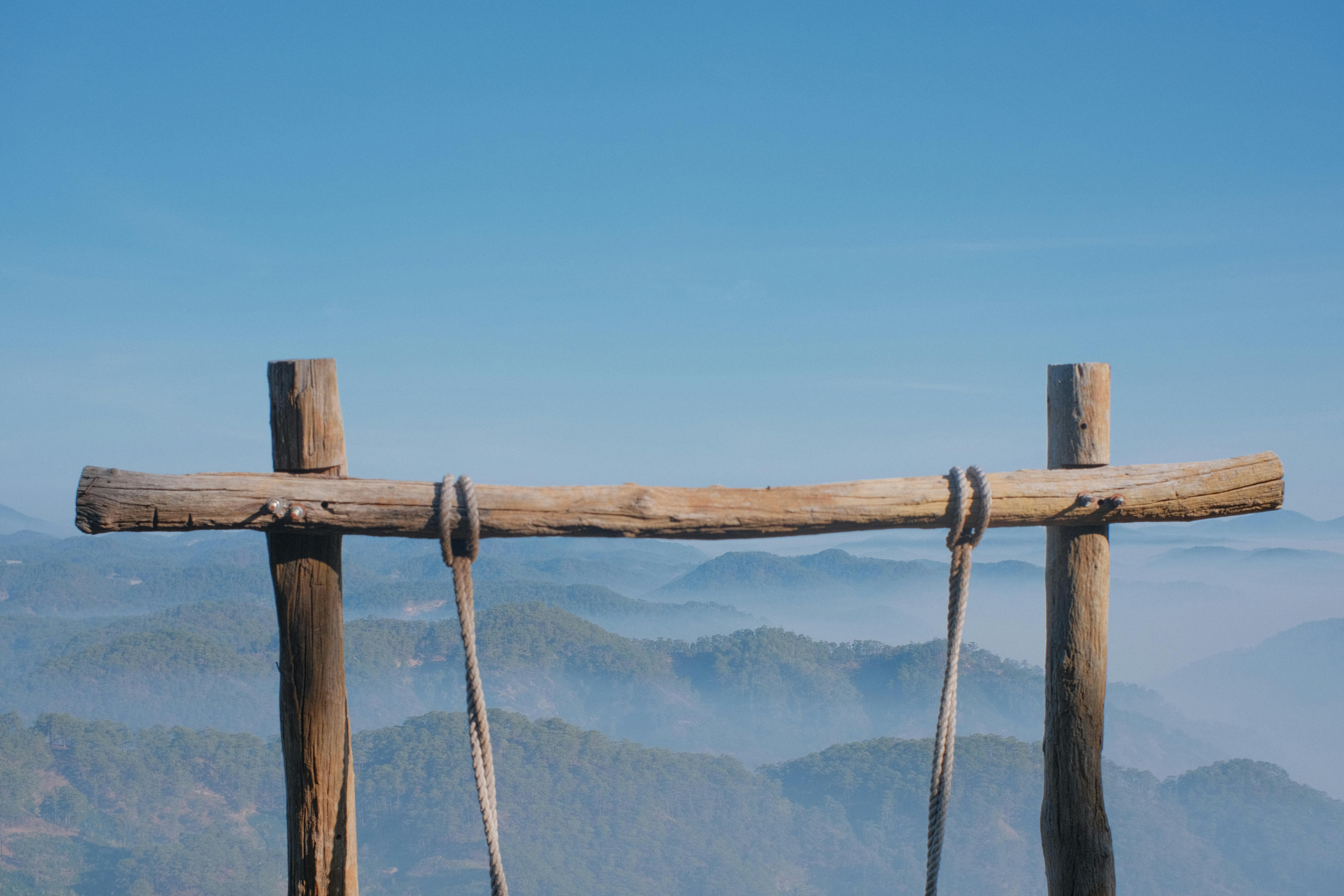 Rustic Wooden Structure Overlooking Misty Mountains · Free Stock Photo