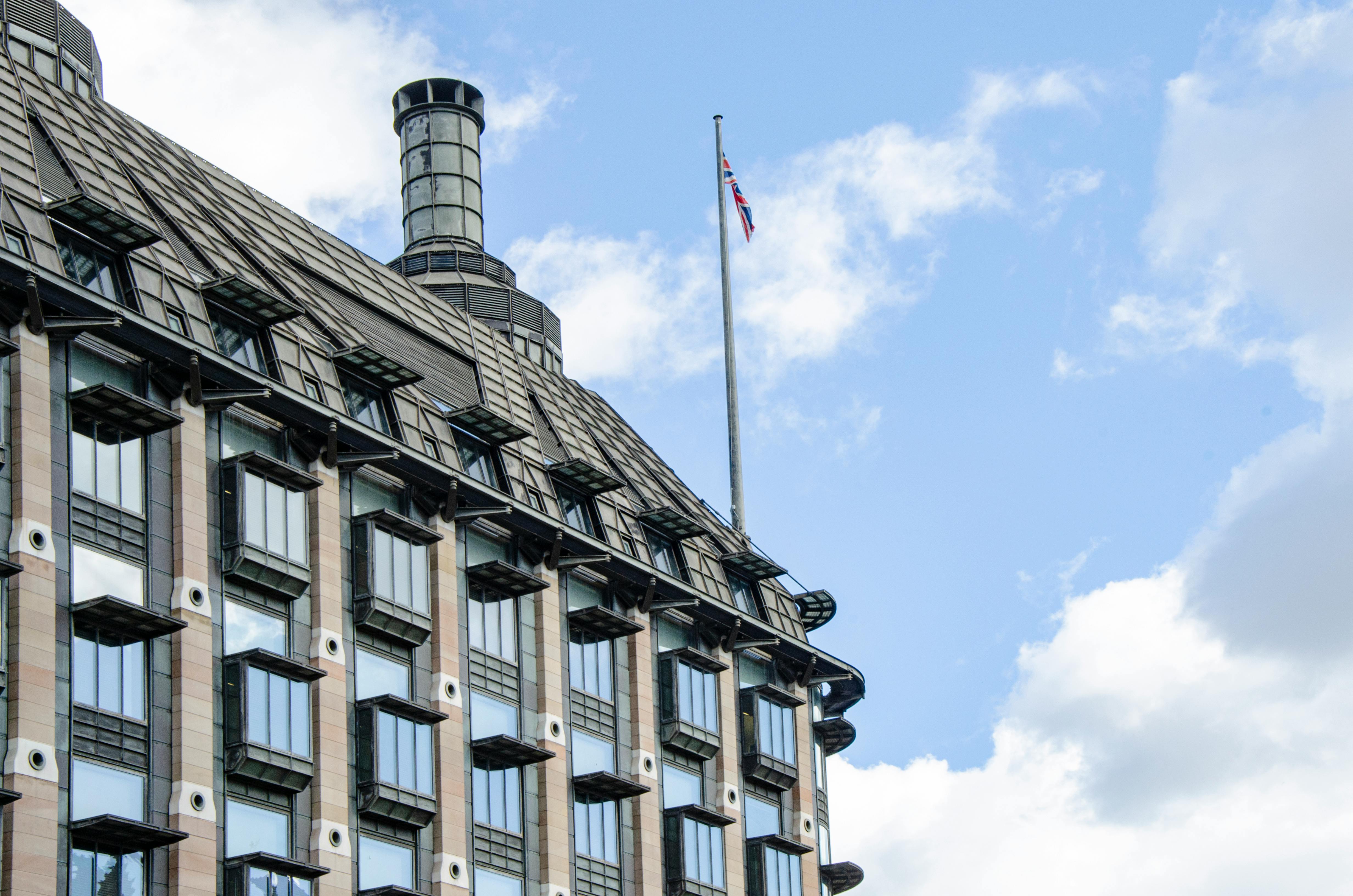 Modern Architectural Building with UK Flag in London · Free Stock Photo