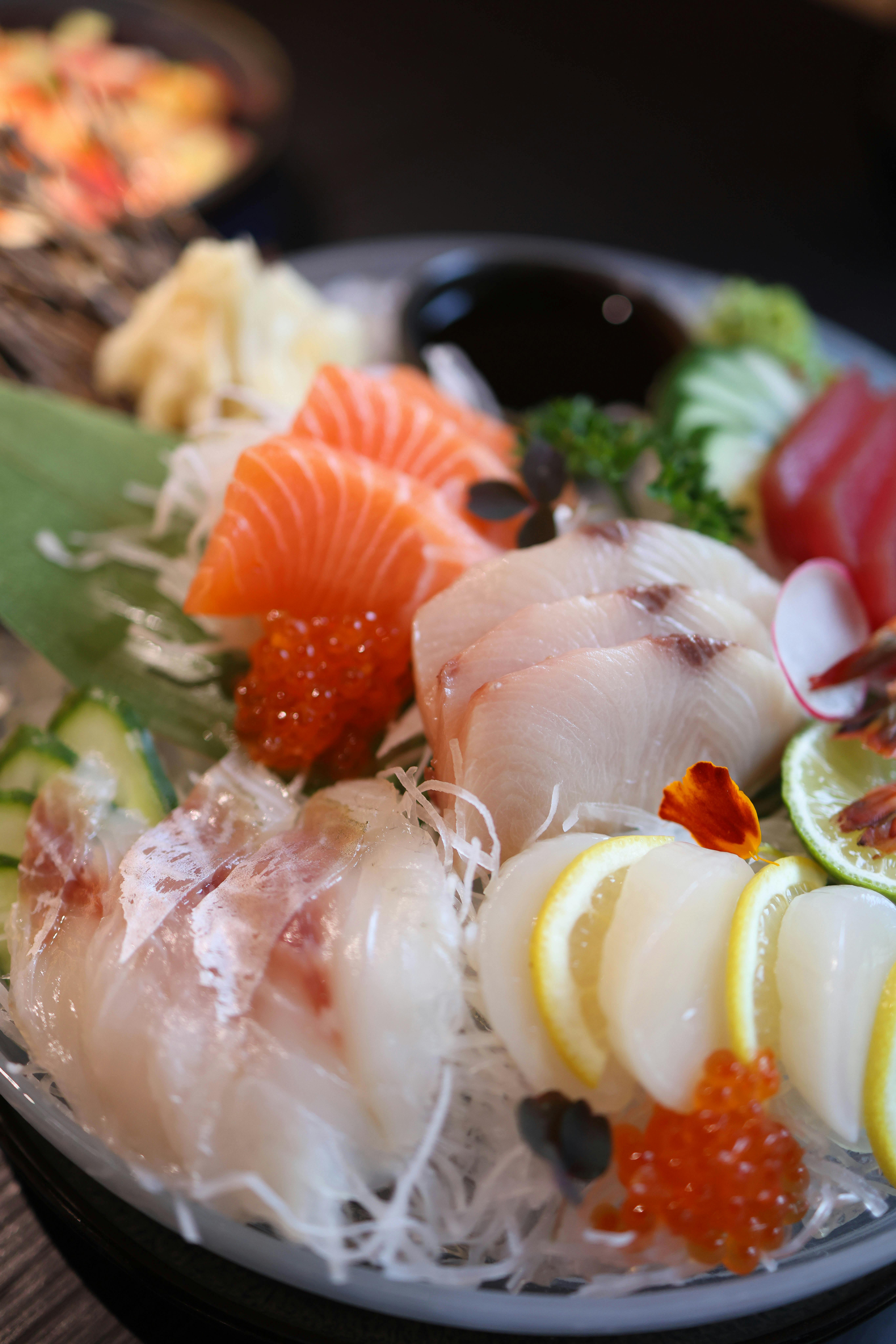 Delicious Assorted Sashimi Platter on Elegant Plate · Free Stock Photo