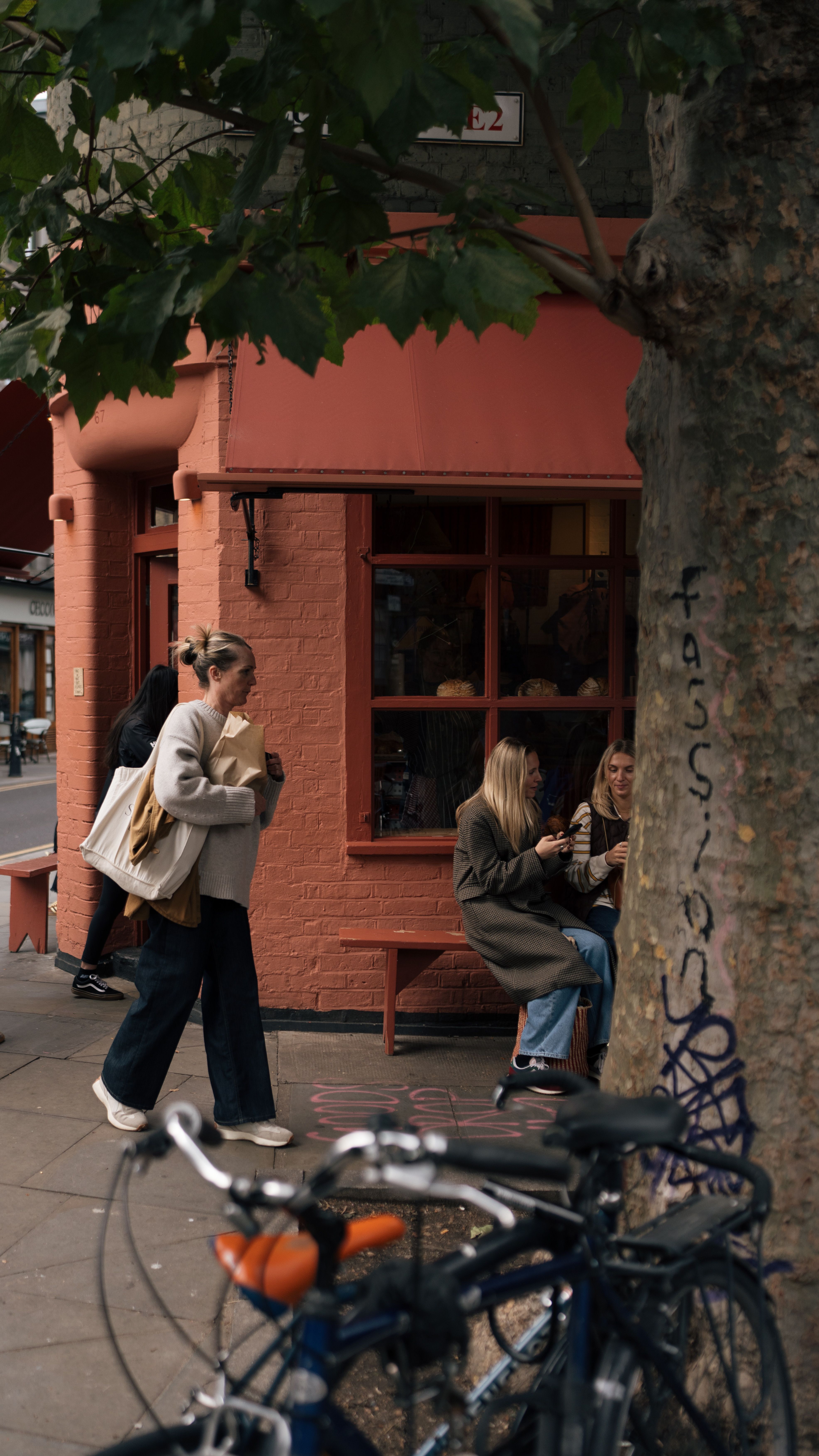 Charming Outdoor Café Scene in Urban Setting · Free Stock Photo