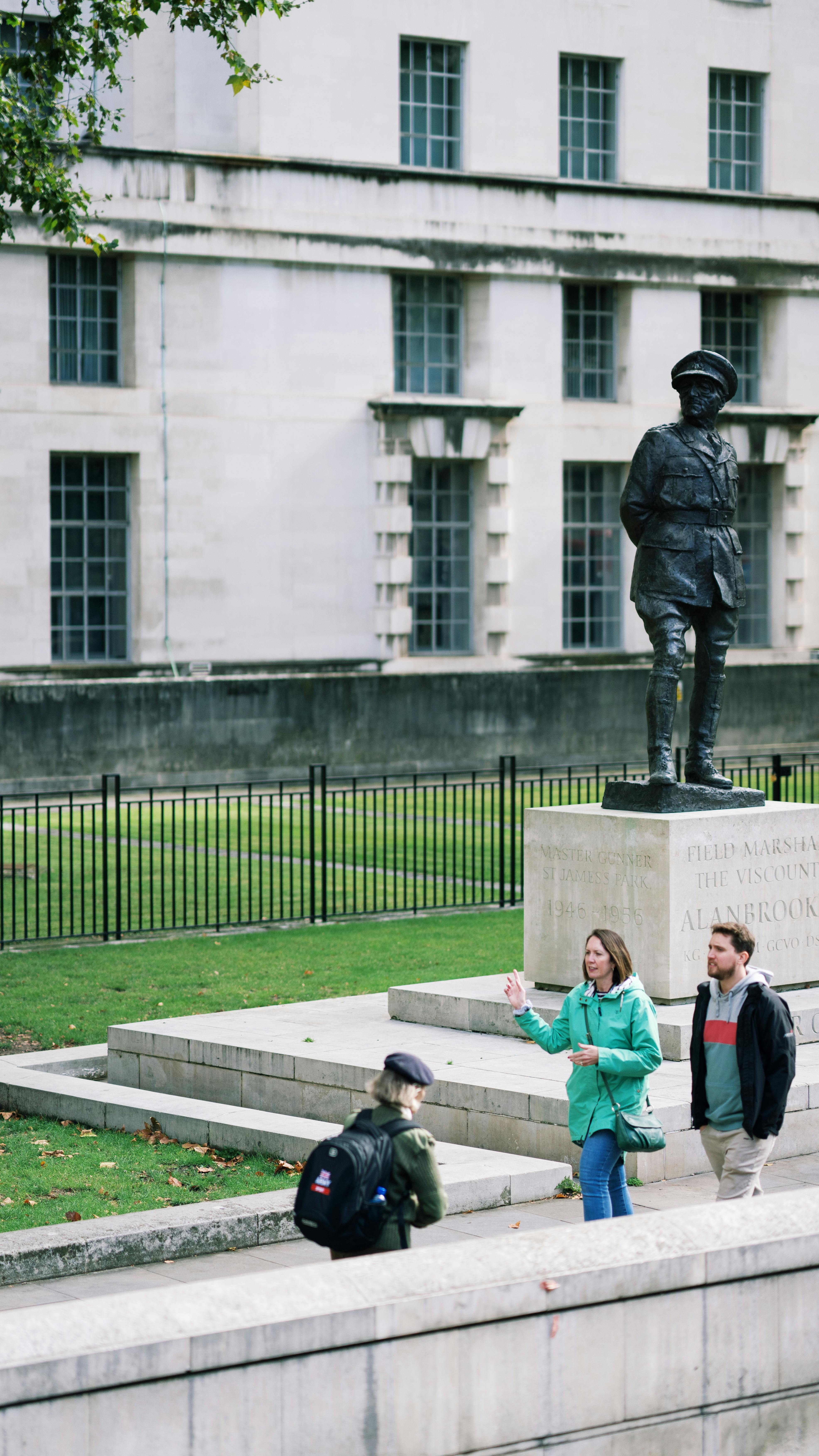 Tourists at Allanbrooke Statue in London Park · Free Stock Photo