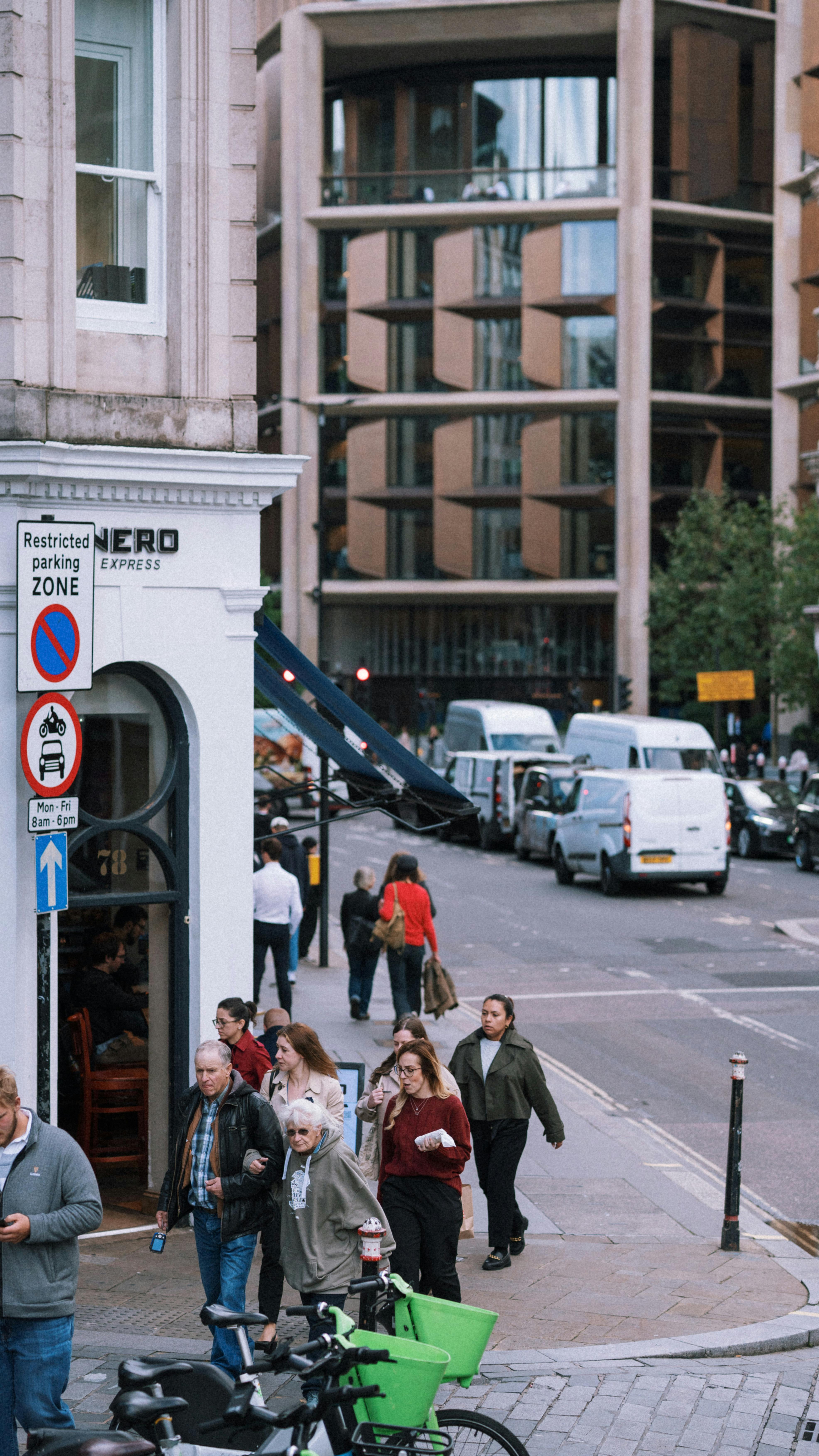 Busy Urban Street Scene in Modern Cityscape · Free Stock Photo