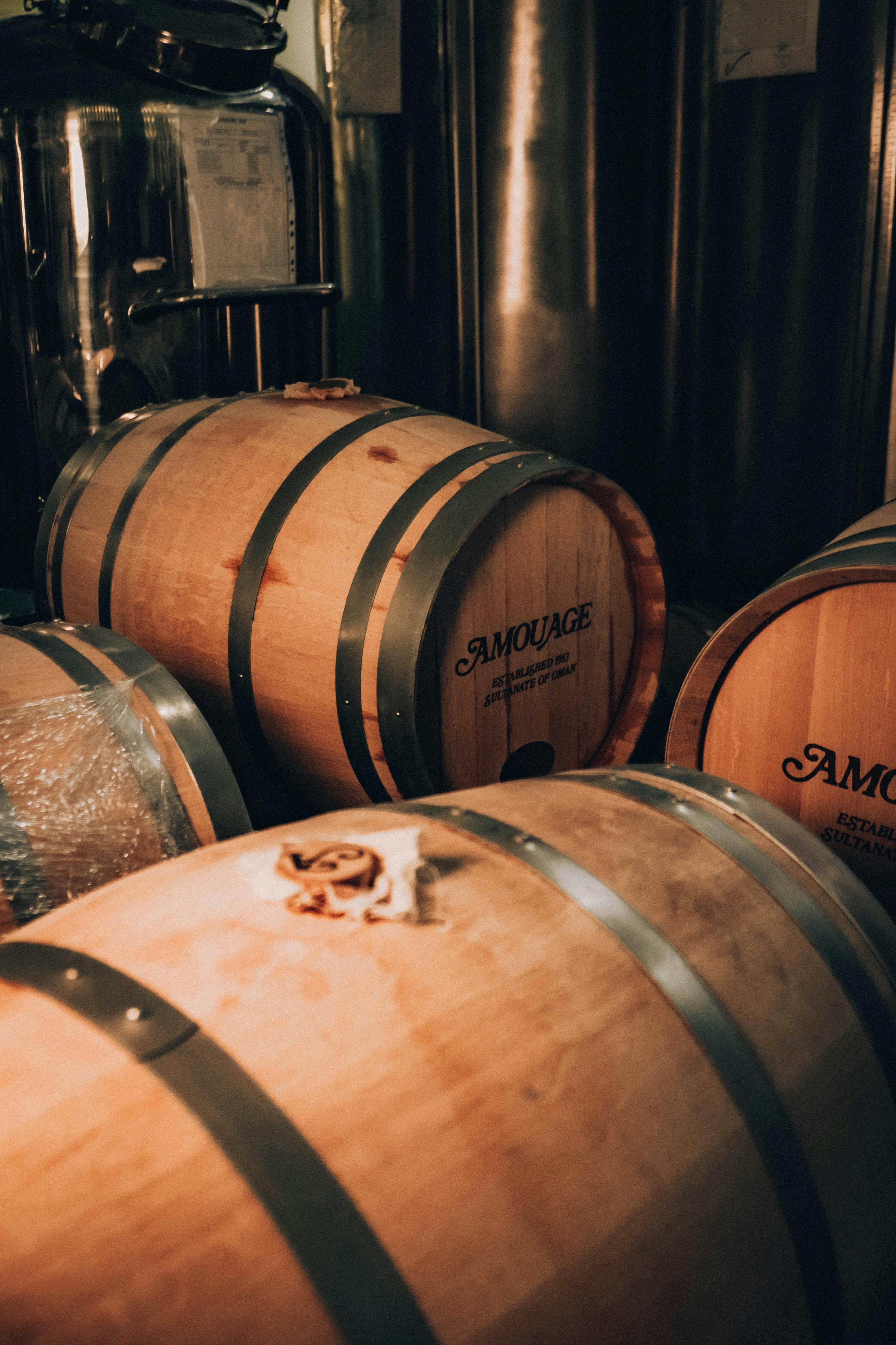 Luxury Perfume Barrels in Muscat Factory · Free Stock Photo