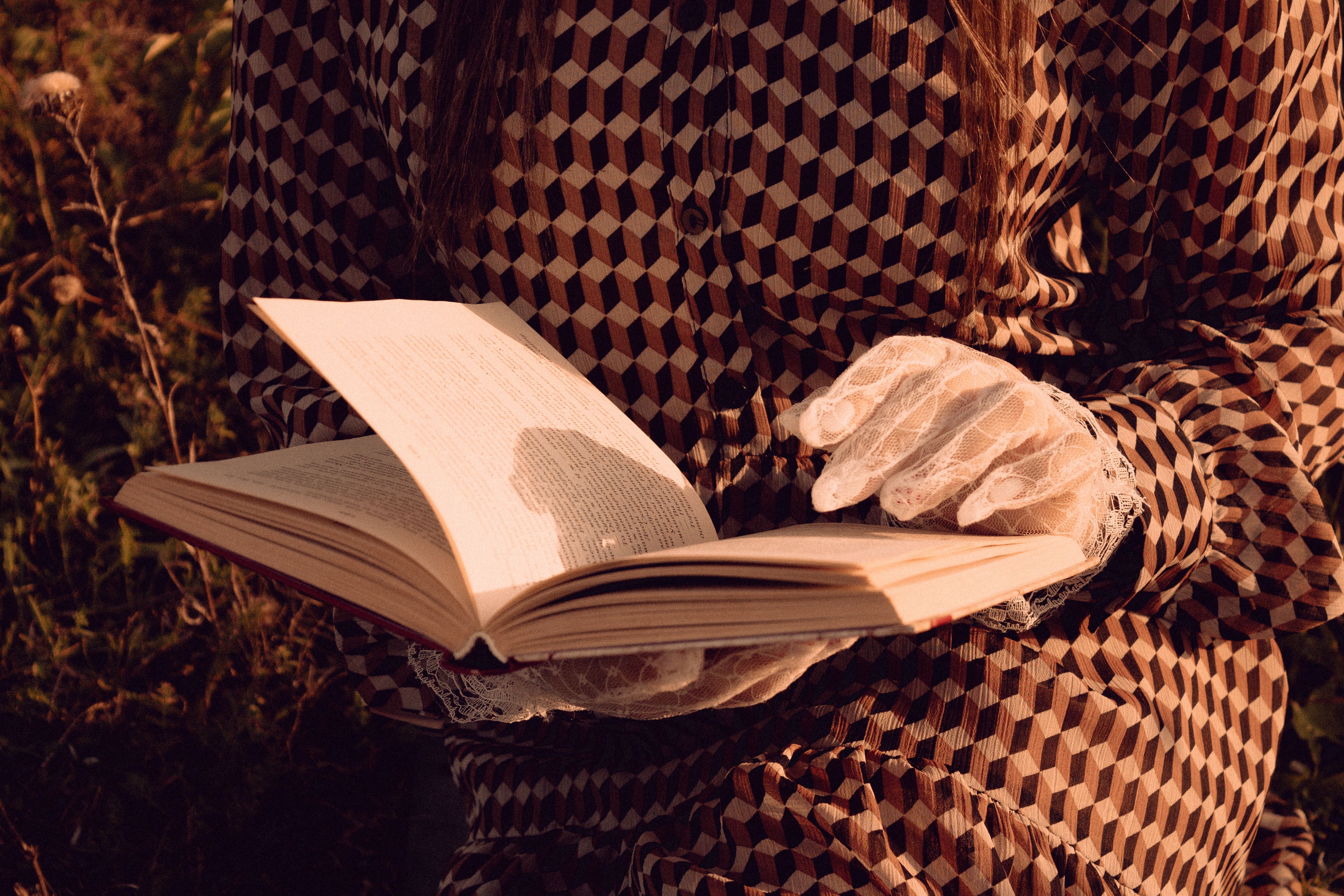 Vintage Style Woman Reading Outdoors · Free Stock Photo