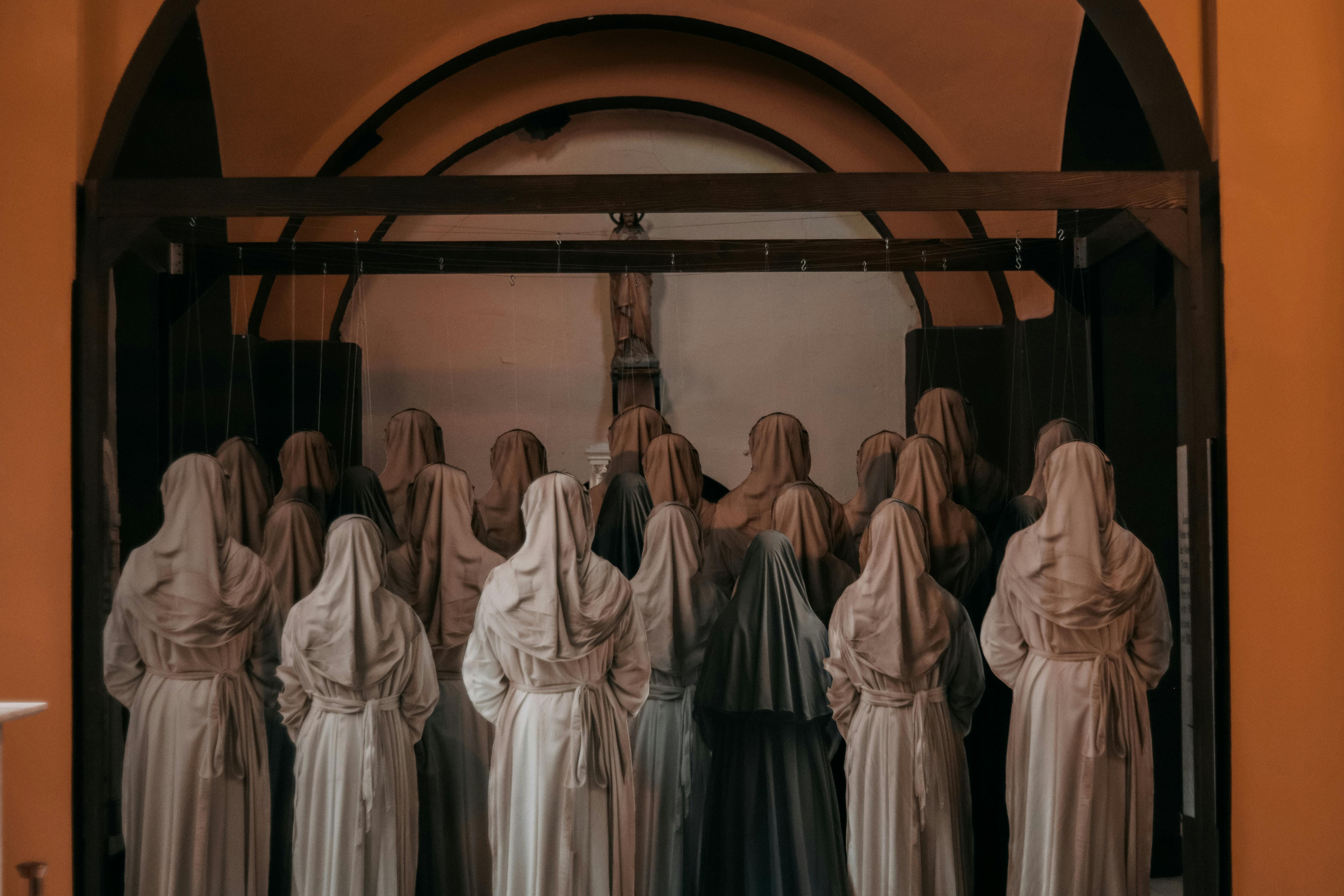 Nuns in Prayer at Chapel Altar Back View · Free Stock Photo