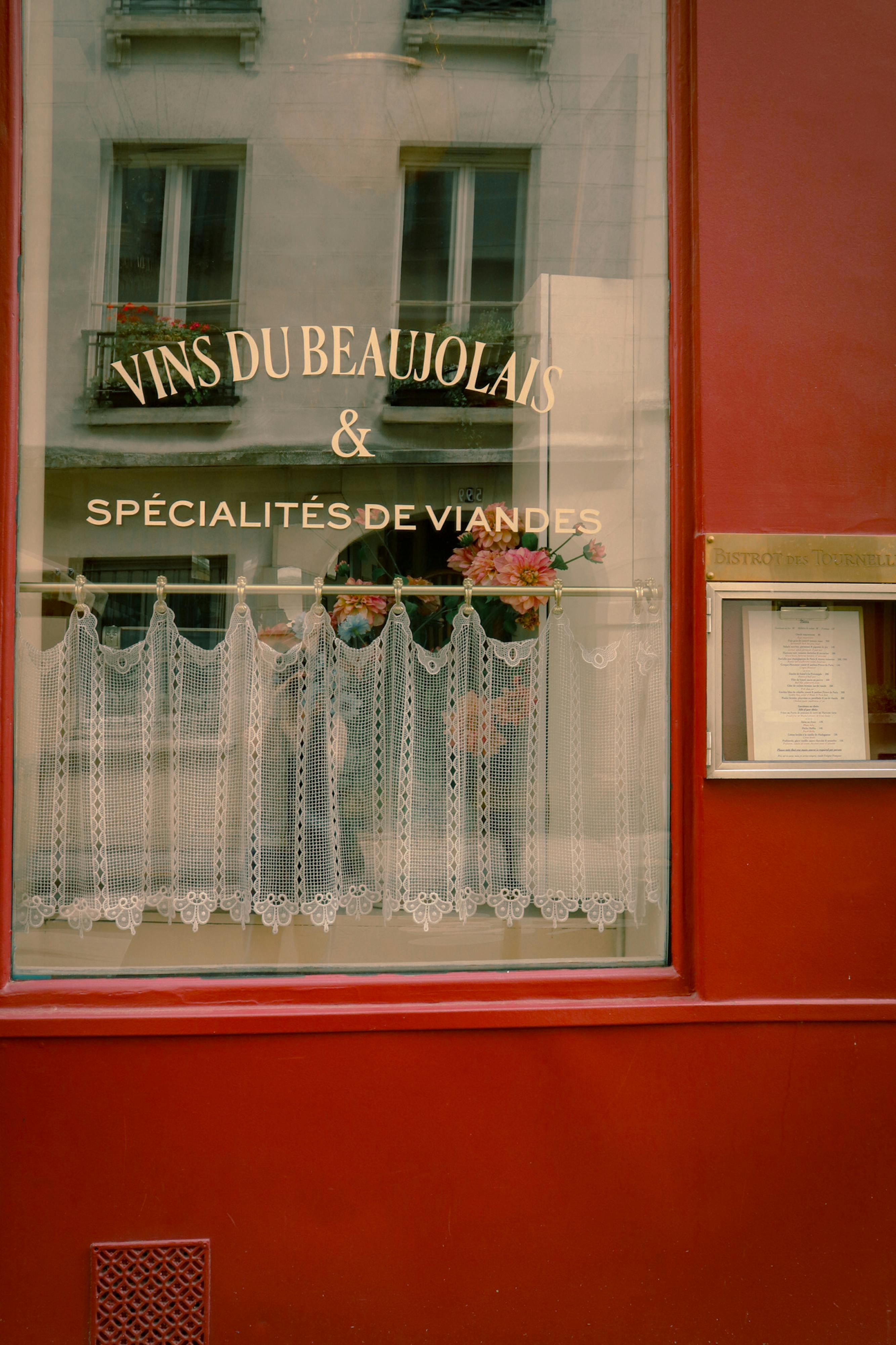 Parisian Café Window Display with Wine and Meat Specialties · Free ...