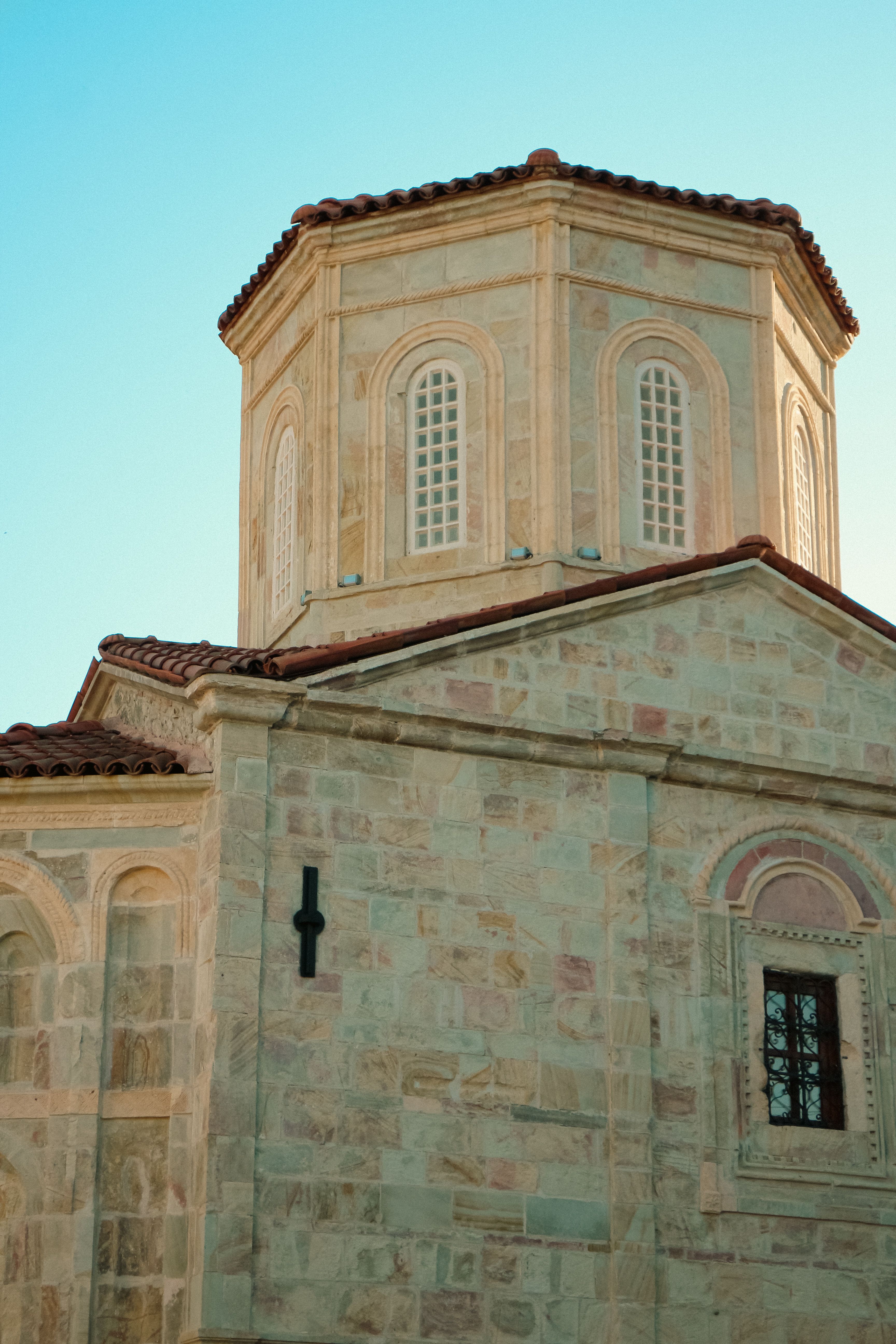 Historic Stone Church Exterior with Dome · Free Stock Photo
