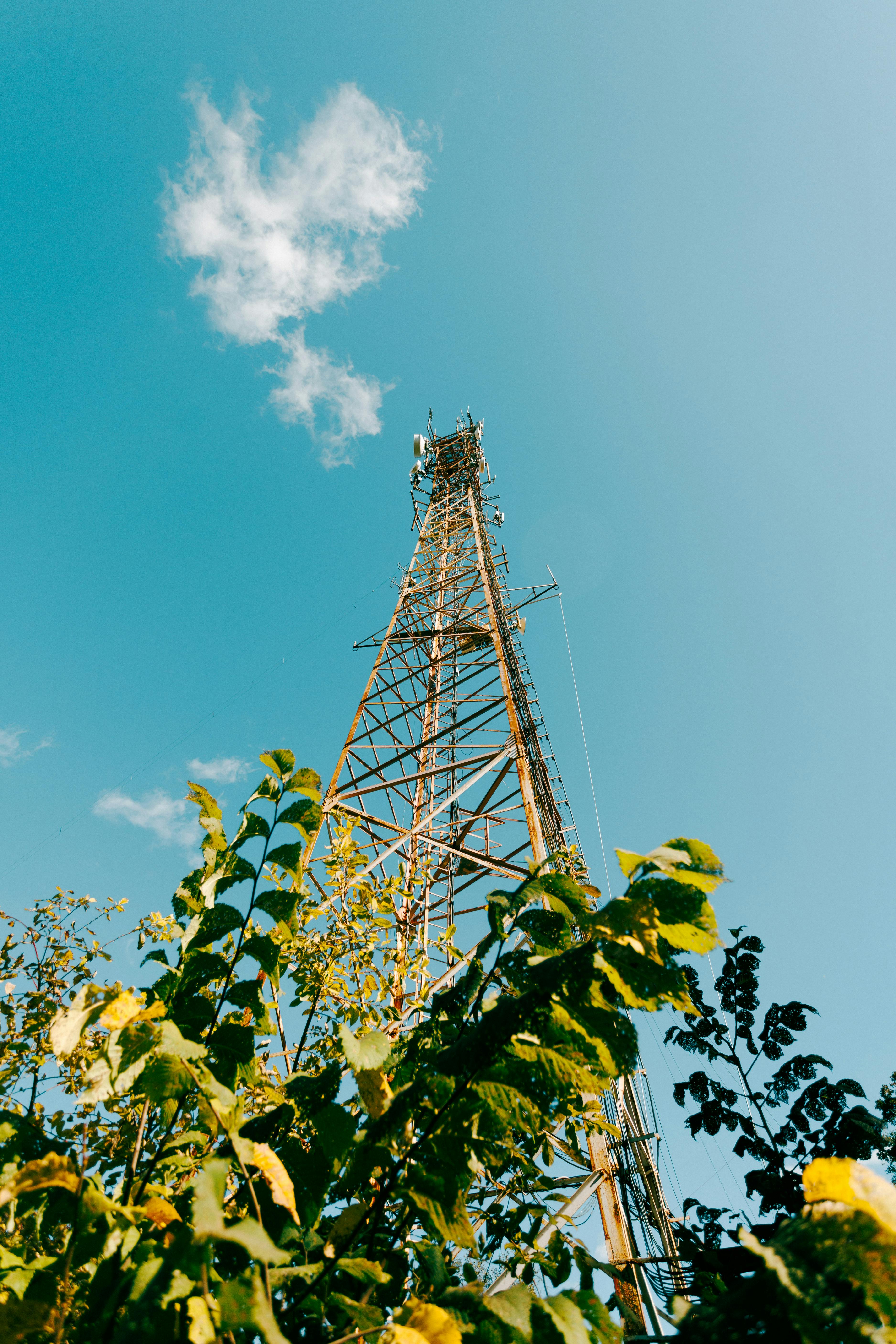 Tall Communications Tower Against Blue Sky · Free Stock Photo