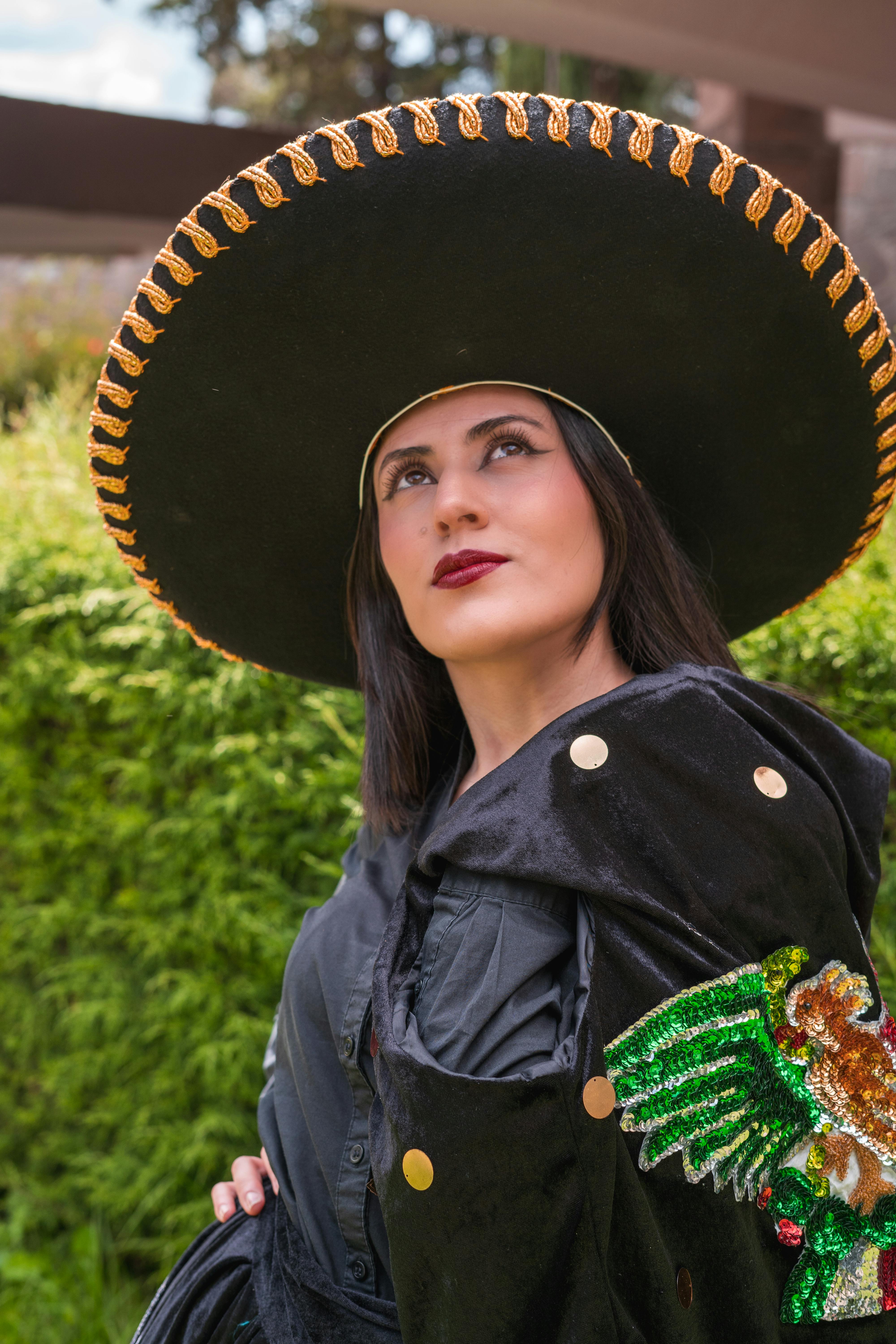 Elegant Woman in Traditional Mexican Sombrero Outdoors · Free Stock Photo