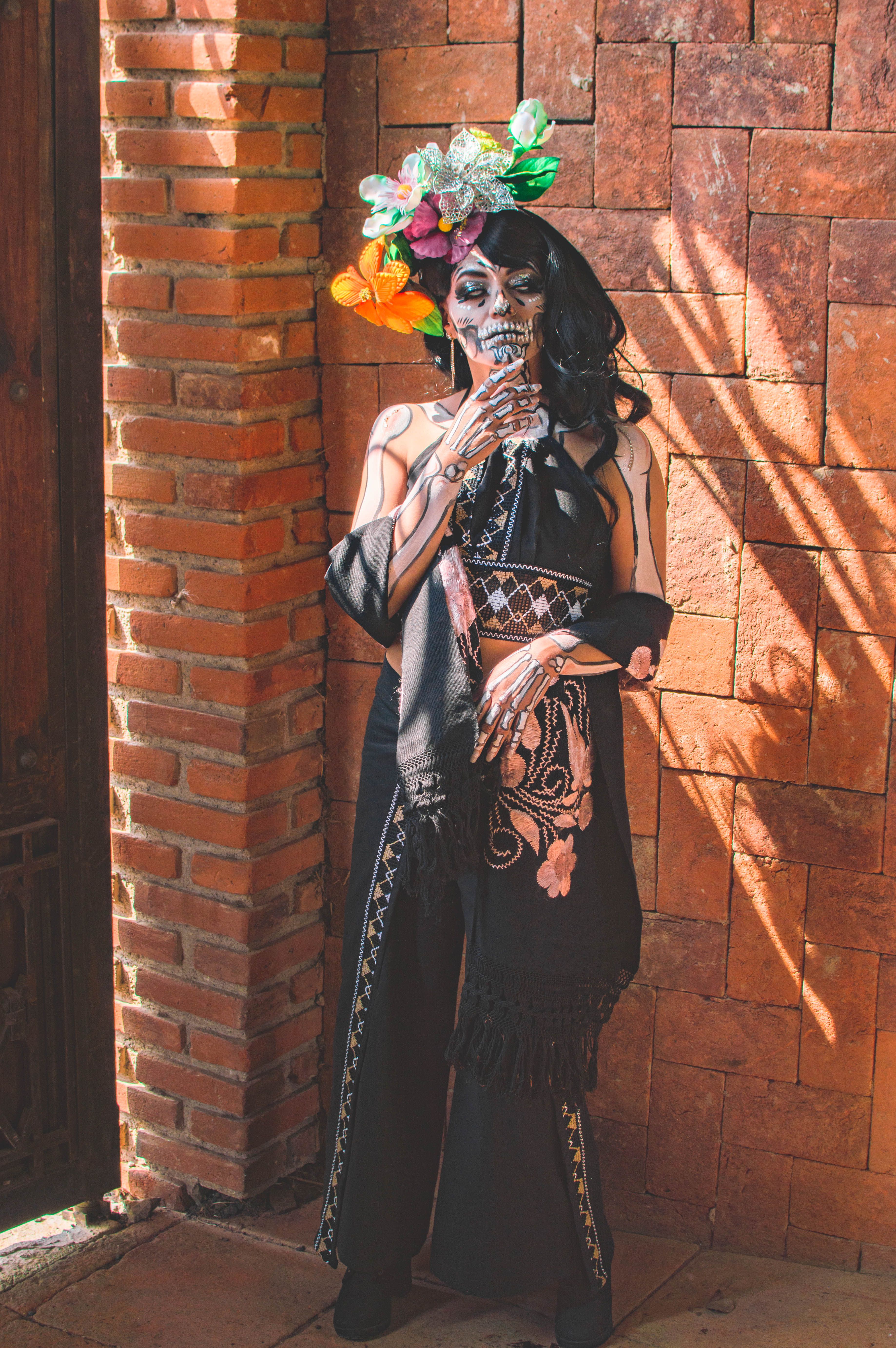 Elegant Catrina in Traditional Day of the Dead Attire · Free Stock Photo
