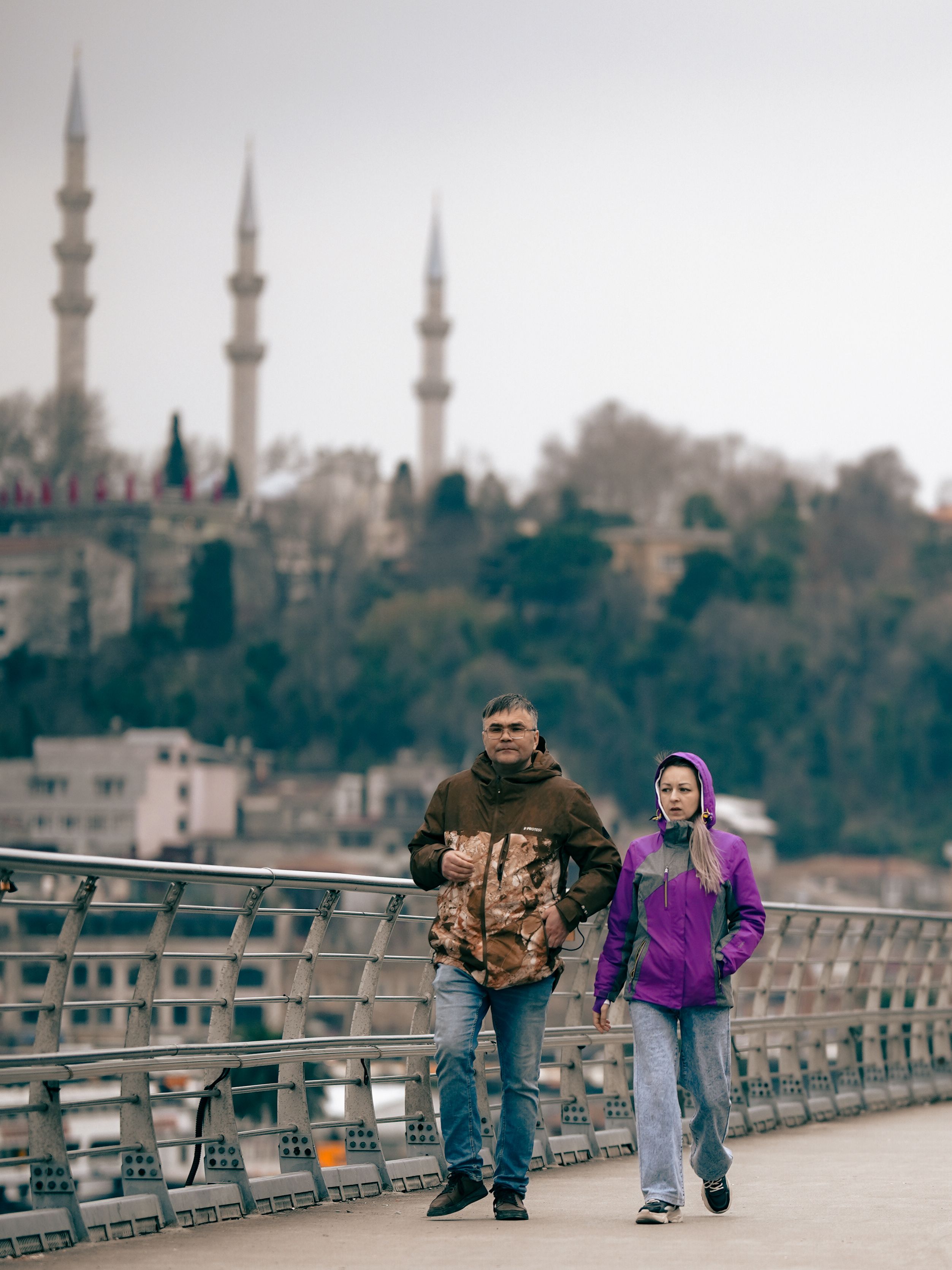 Father and Daughter Walking on Istanbul Bridge · Free Stock Photo