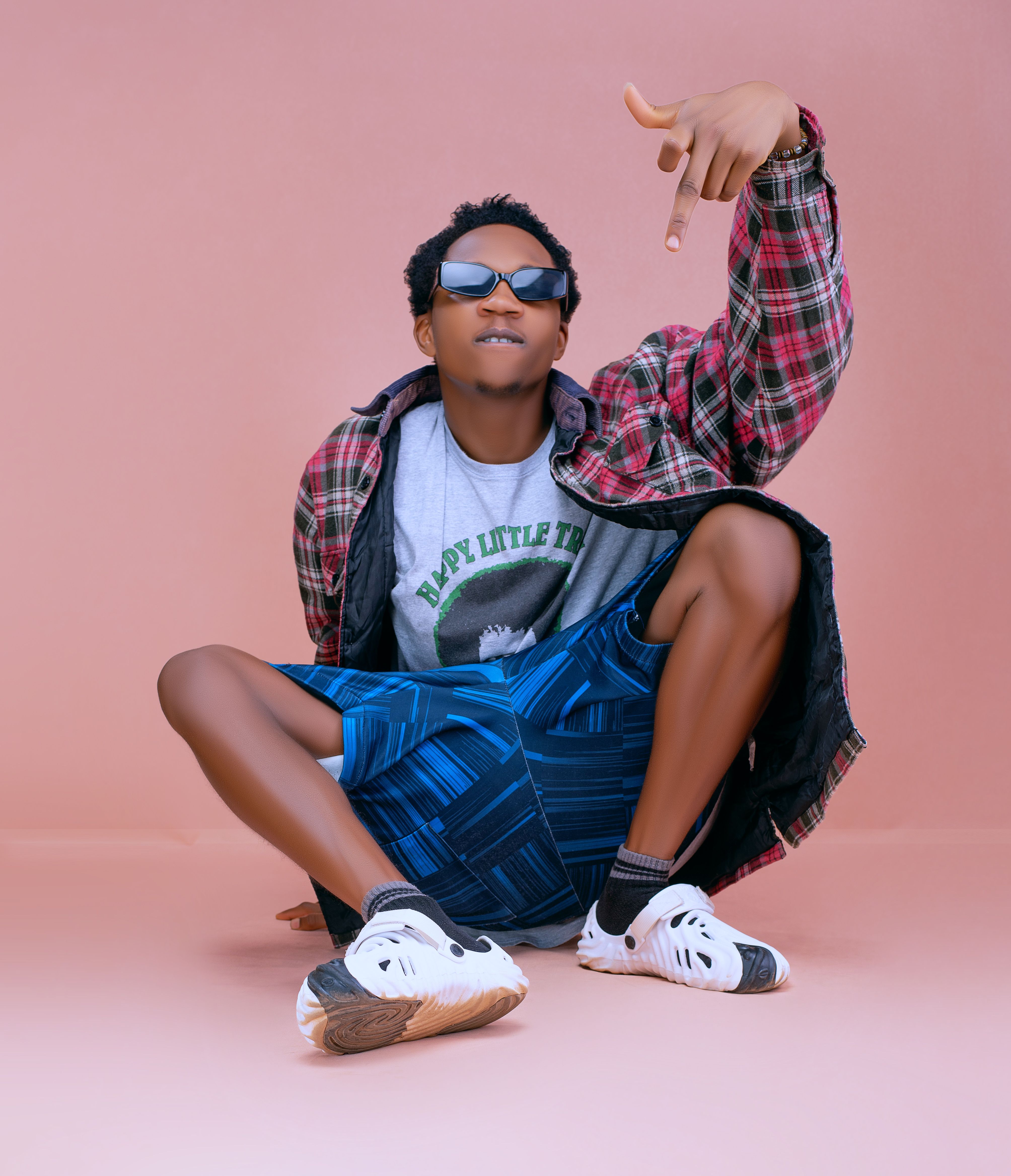 Stylish Young Man Posing in Casual Urban Attire · Free Stock Photo