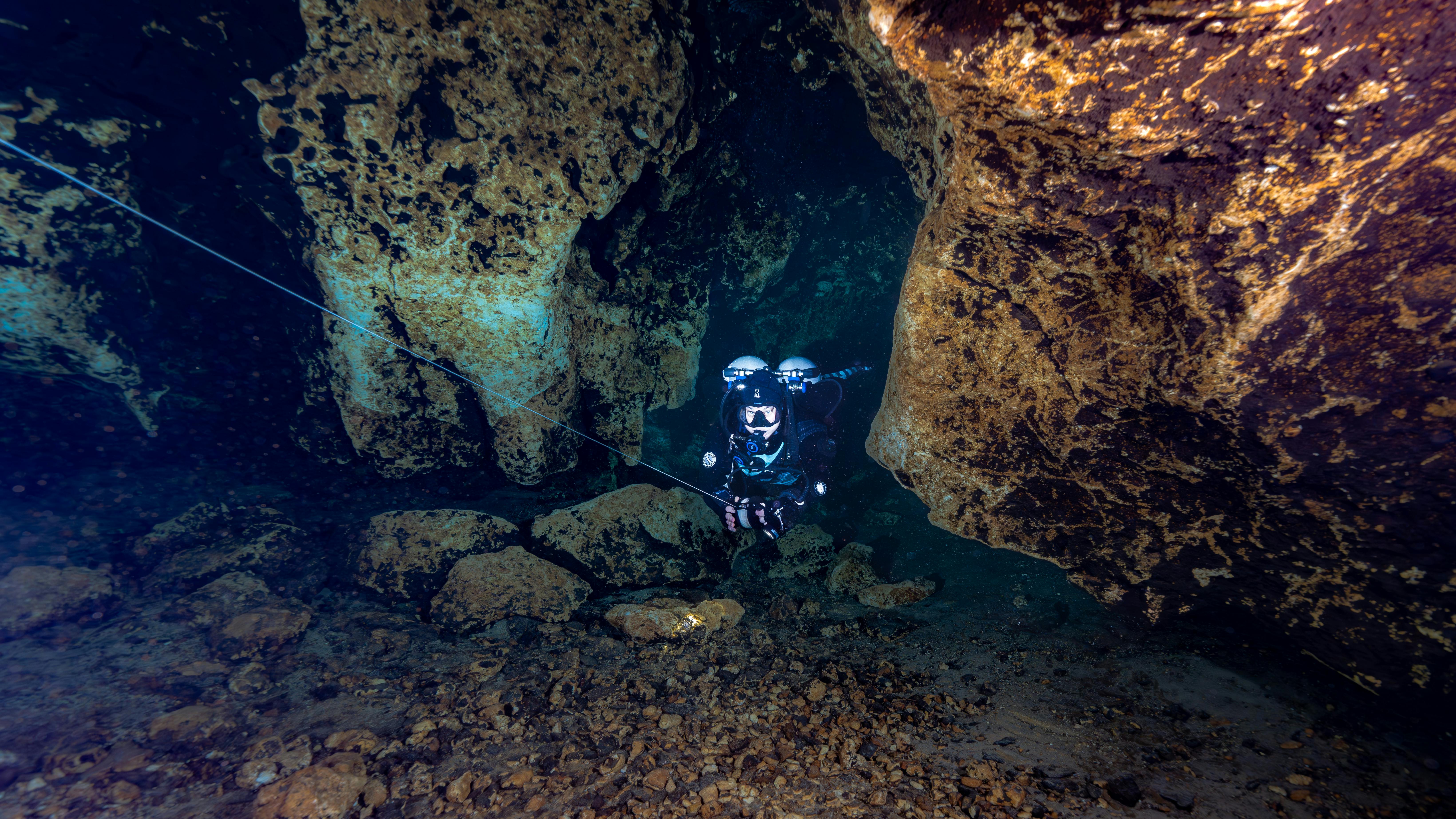Thrilling Underwater Cave Diving Adventure · Free Stock Photo