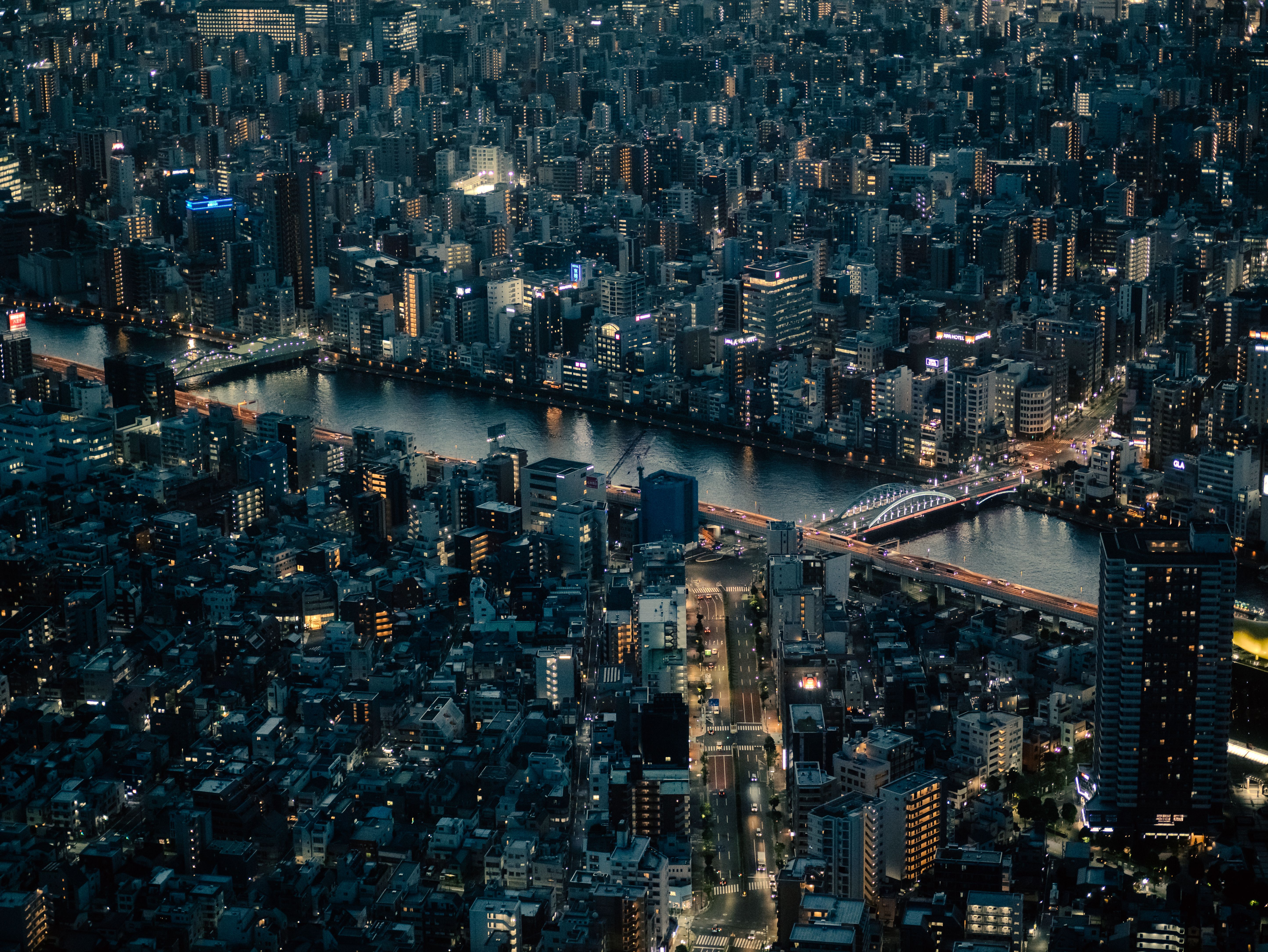 Aerial View of Nighttime Tokyo Cityscape with River · Free Stock Photo