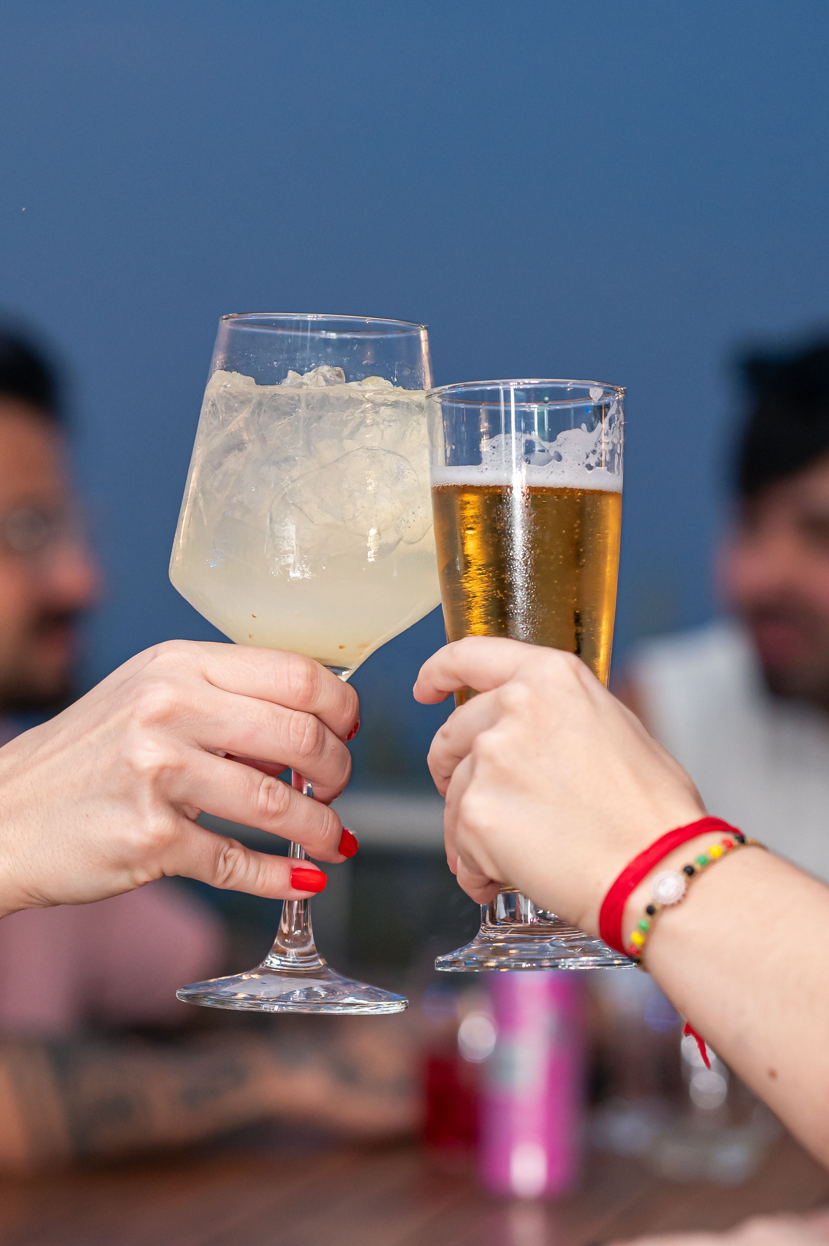 Cheerful Toast with Cocktails and Beer Outdoors · Free Stock Photo