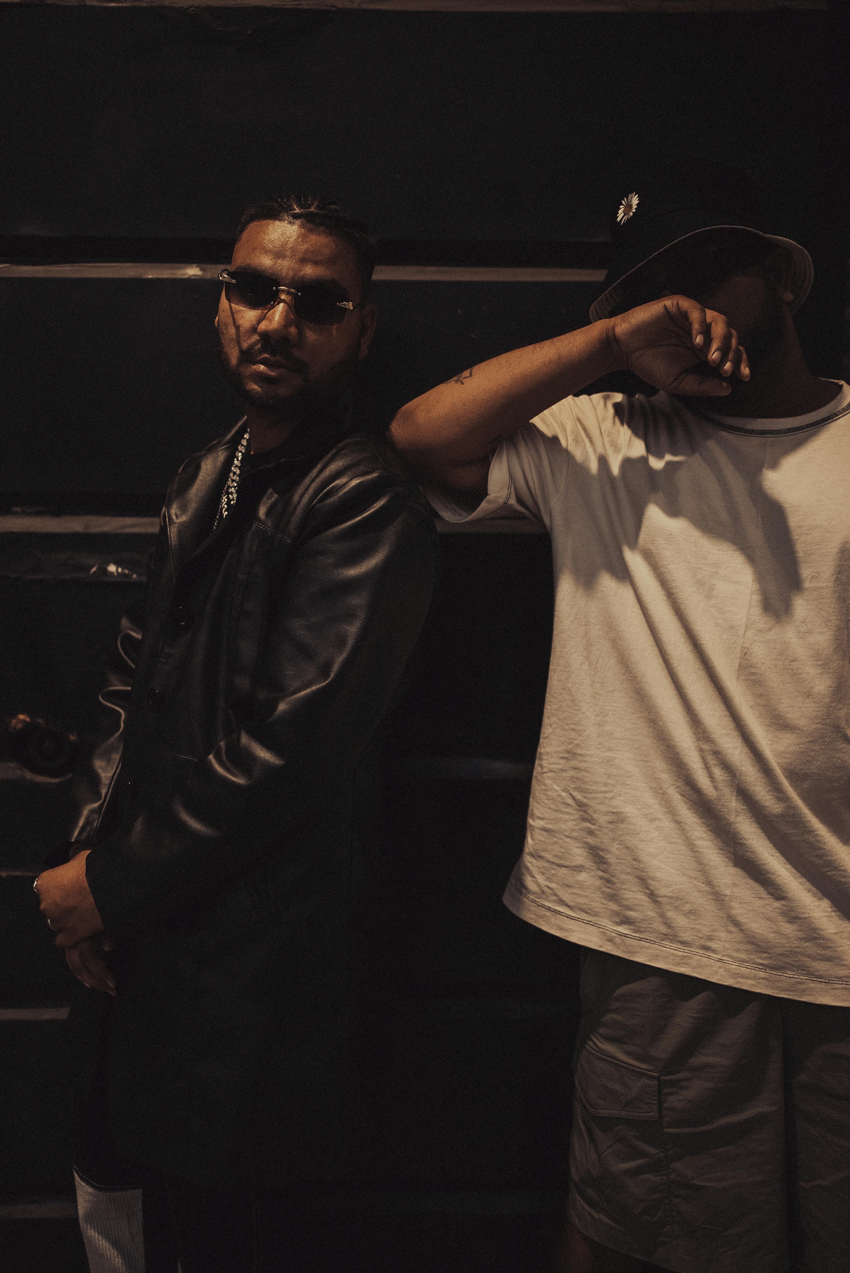 Chill Urban Scene with Two Stylish Adults · Free Stock Photo