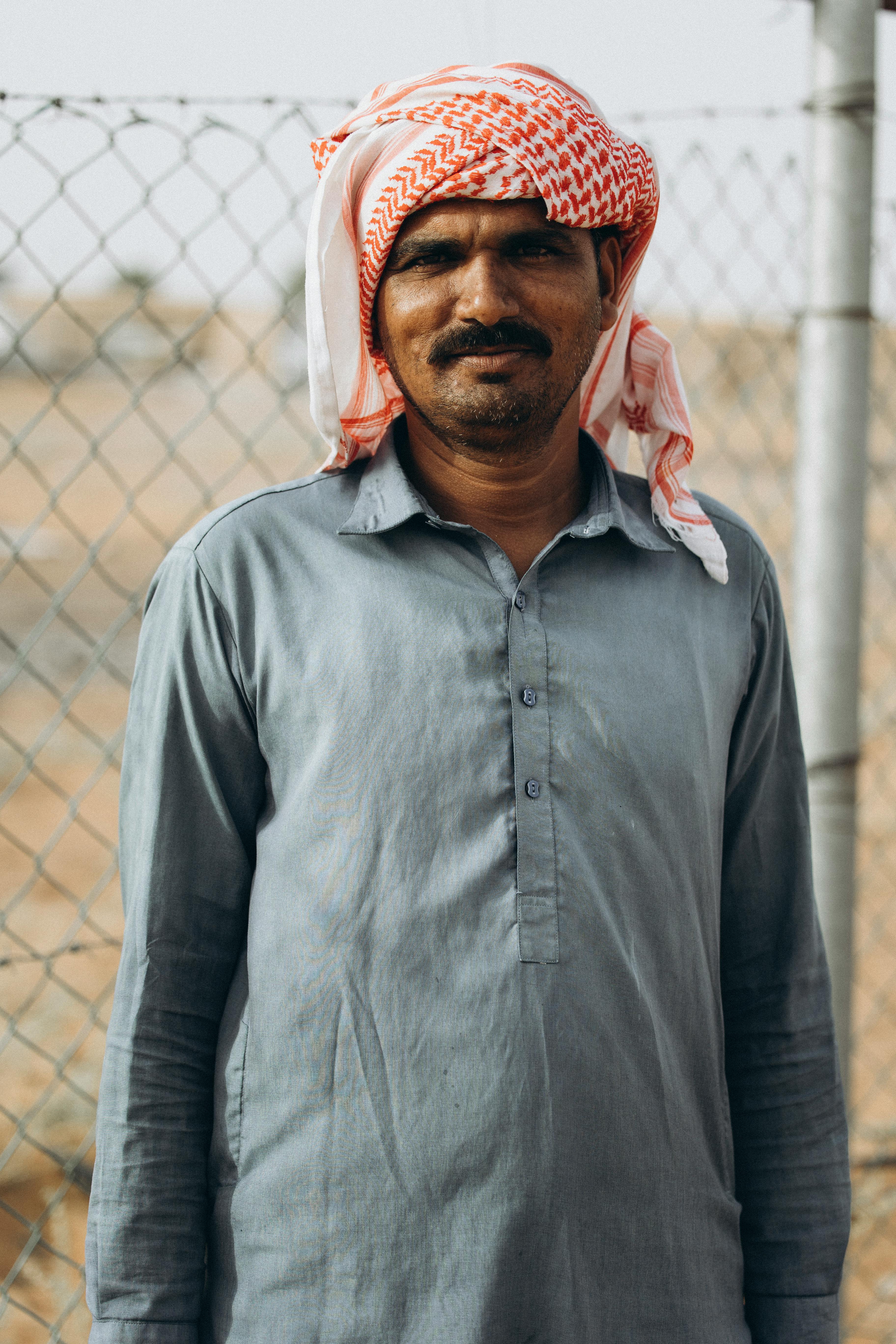 Portrait of a Man in Traditional Middle Eastern Attire · Free Stock Photo